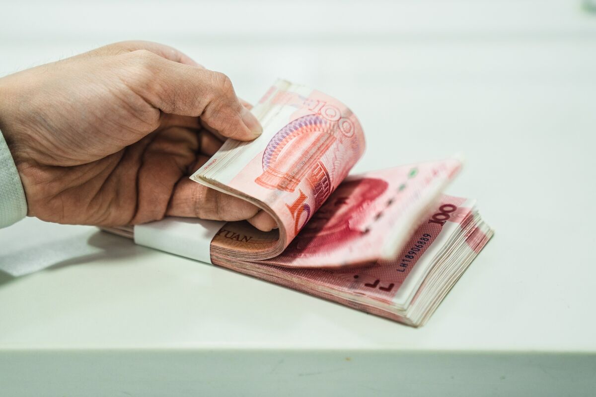 Chinese Yuan Pressured by Biggest Capital Exodus Since 2016 - Bloomberg