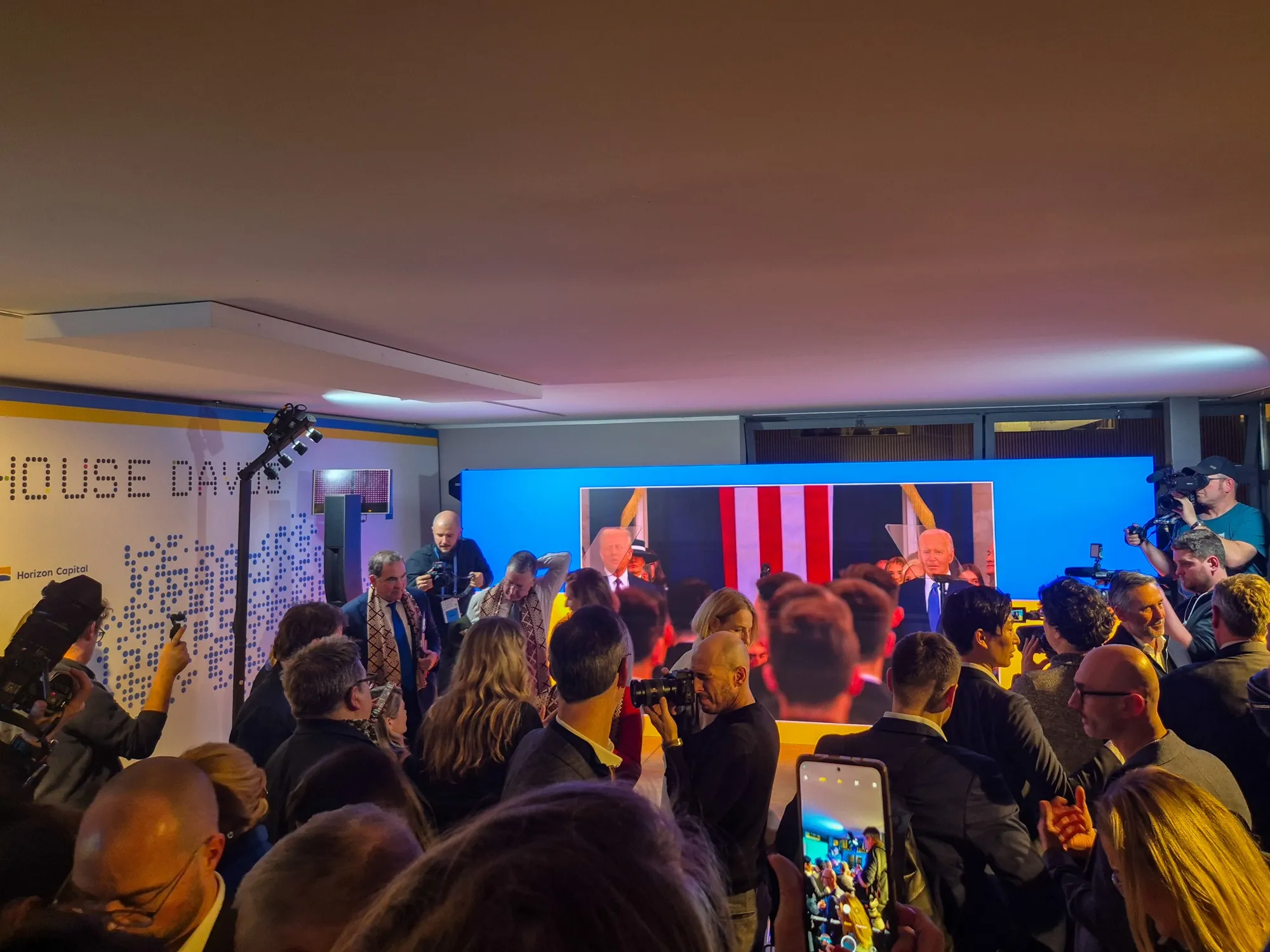 Davos 2025: Crowd Gathers in Ukraine House to Watch Donald Trump's ...