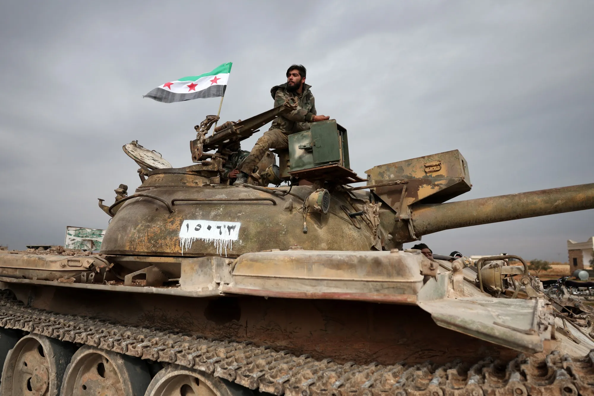 Syria, US-Backed Kurdish Group Sign Deal to End Fighting - Bloomberg