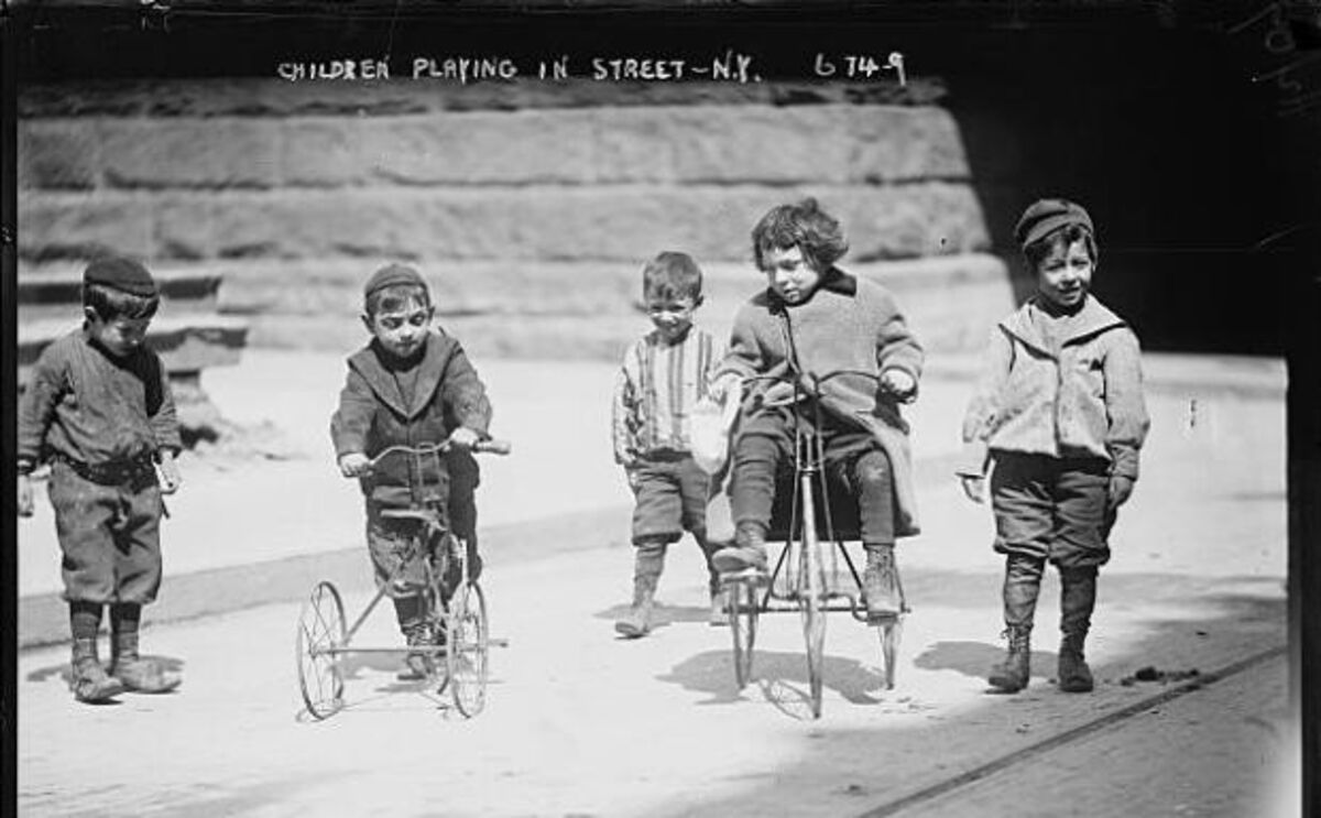 Kids Playing Baseball In The Street