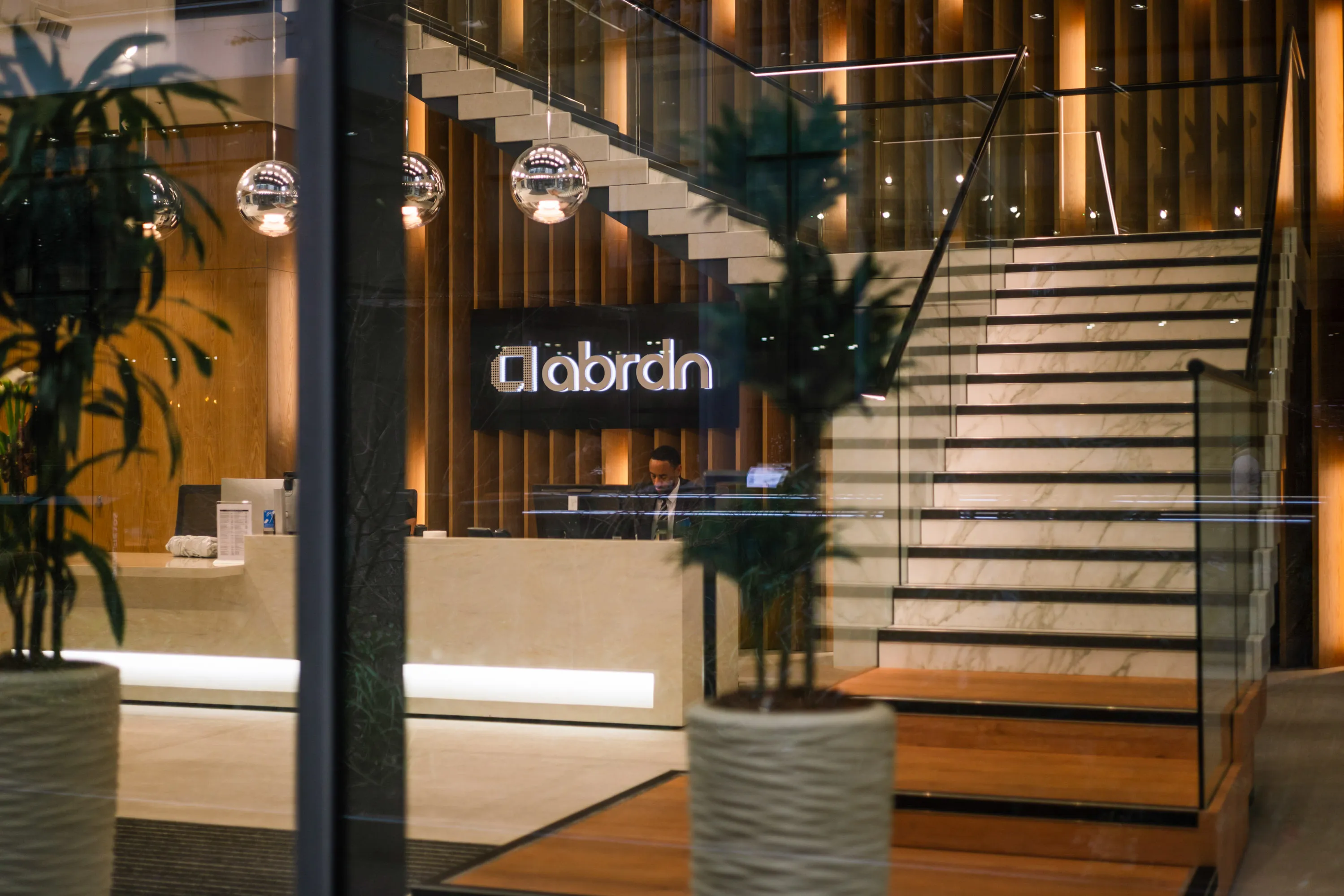 Abrdn Sees Net Inflows as Assets Under Management Increase - Bloomberg