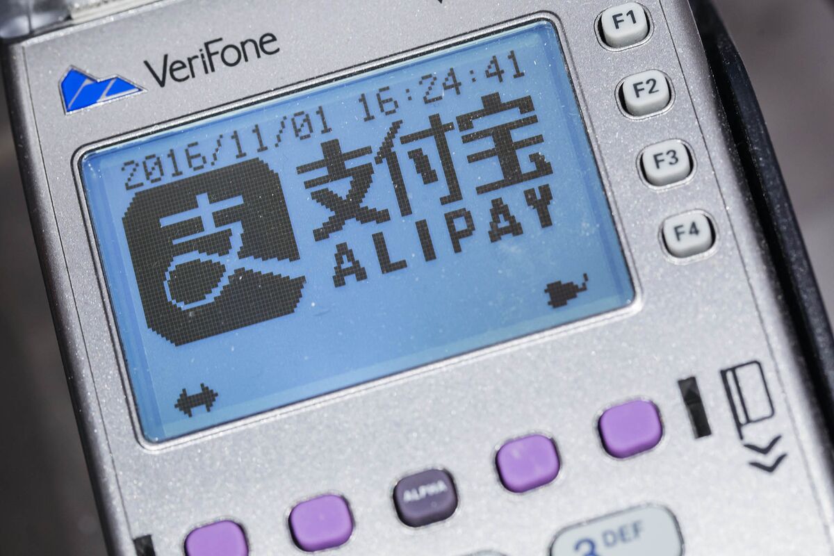 Racy Photos Prompt an Apology From Alipay - Bloomberg