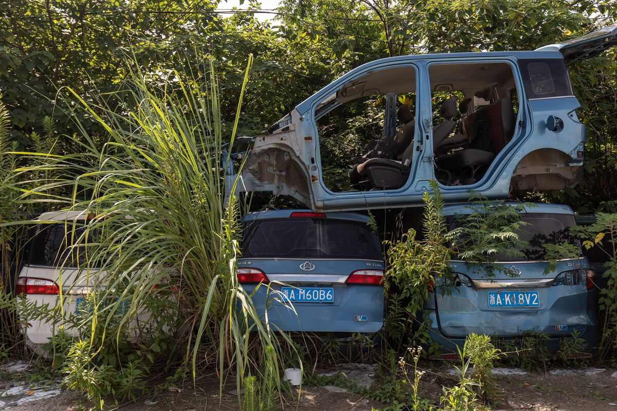China’s Abandoned Electric Cars Pile Up After EV Boom Fueled by Subsidies
