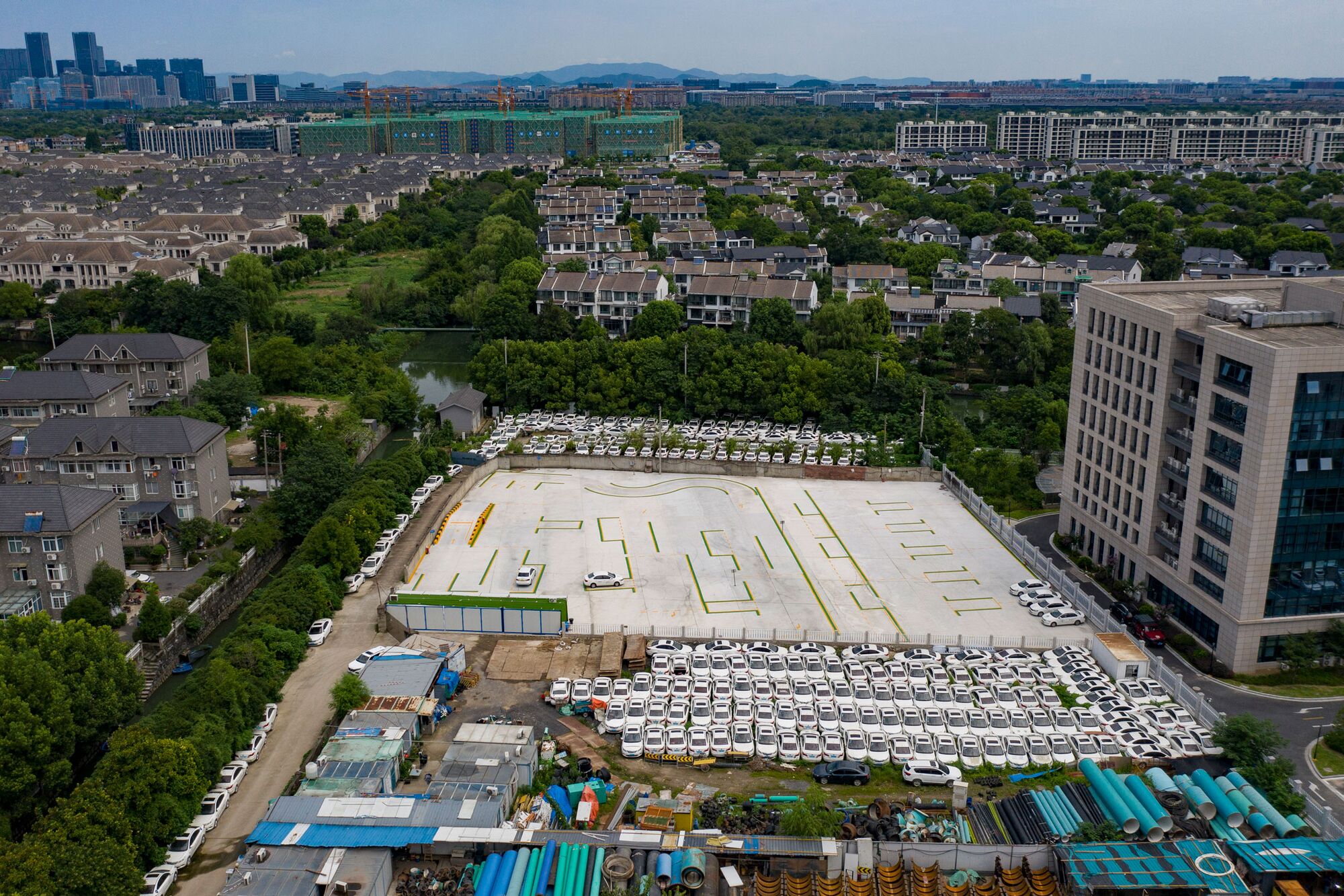 China’s Abandoned Electric Cars Pile Up After EV Boom Fueled by Subsidies