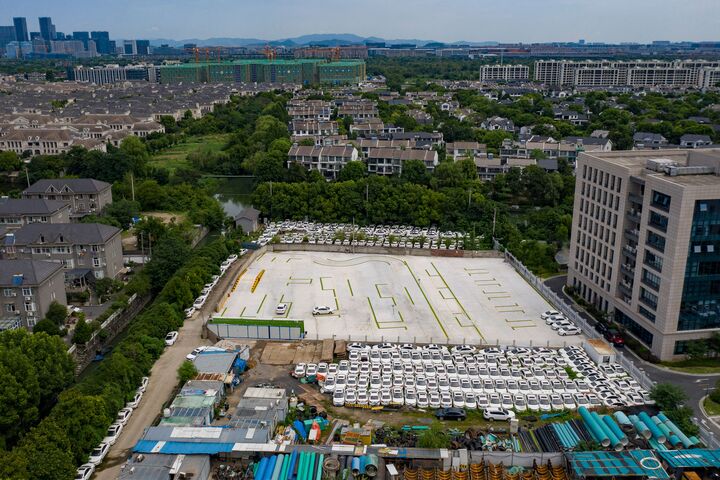 China’s Abandoned Electric Cars Pile Up After EV Boom Fueled by Subsidies