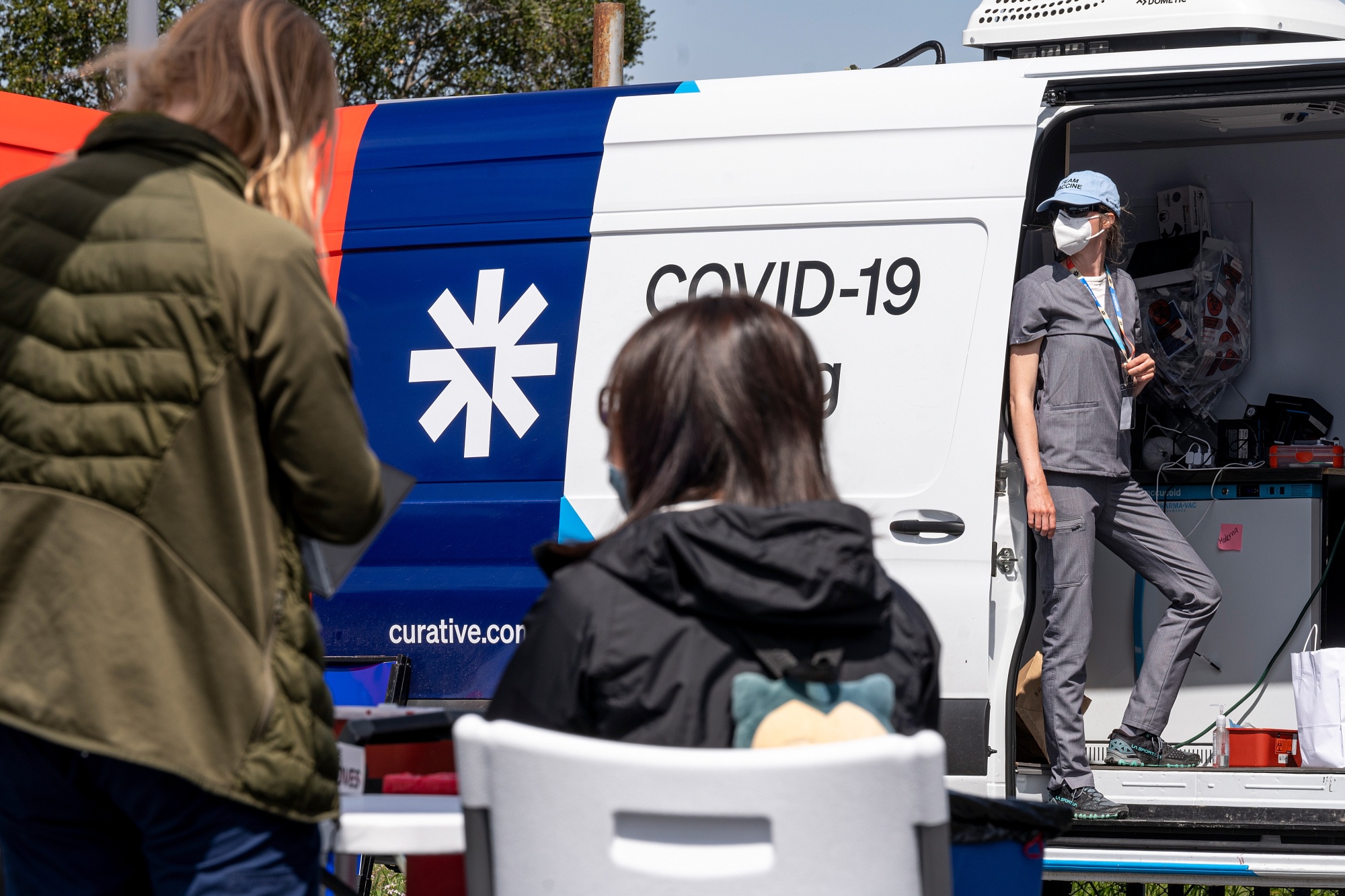 Mobile Vaccine Units Offer a Lifeline - Bloomberg