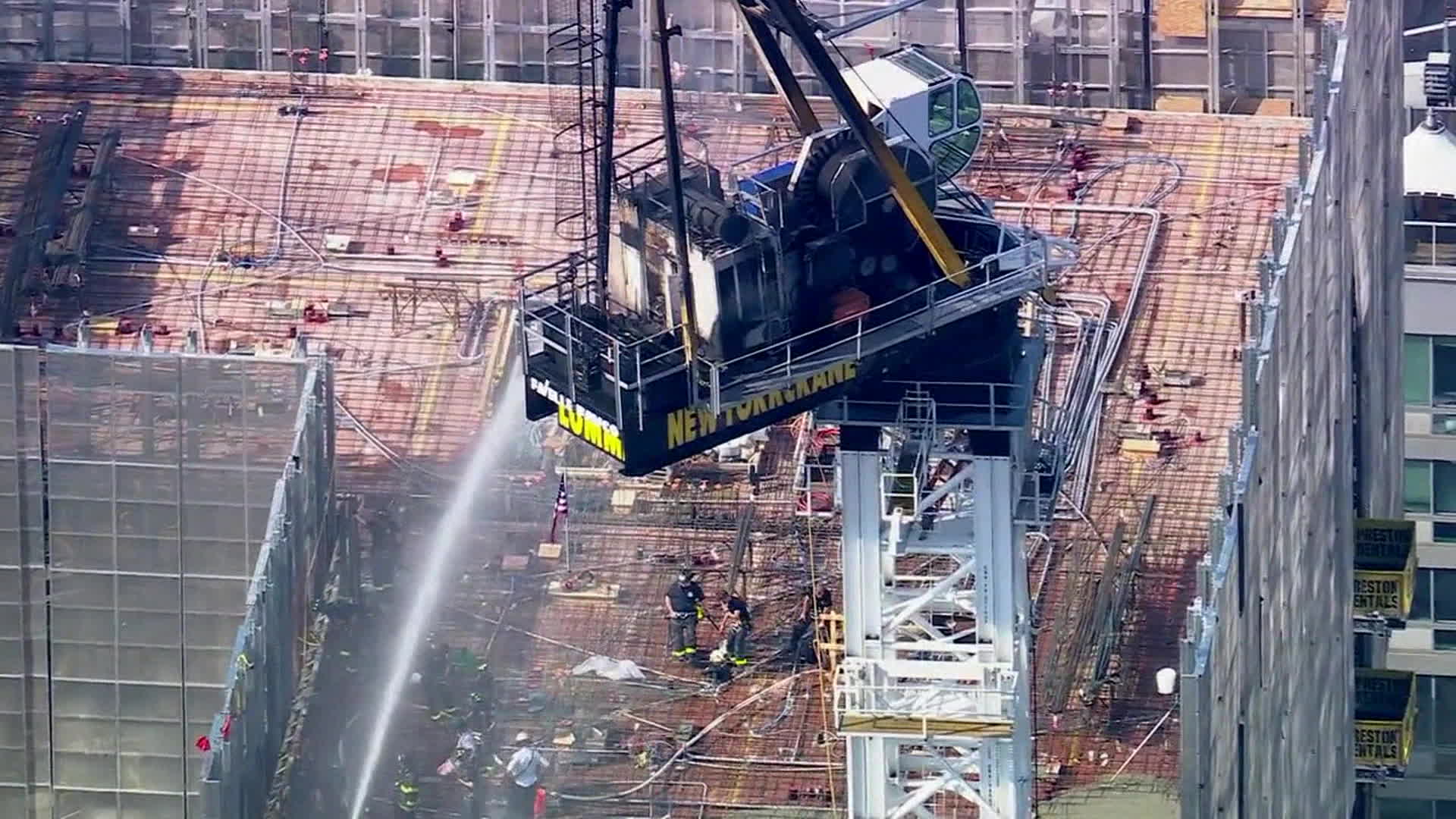 Watch Crane Catches Fire and Collapses in New York City - Bloomberg