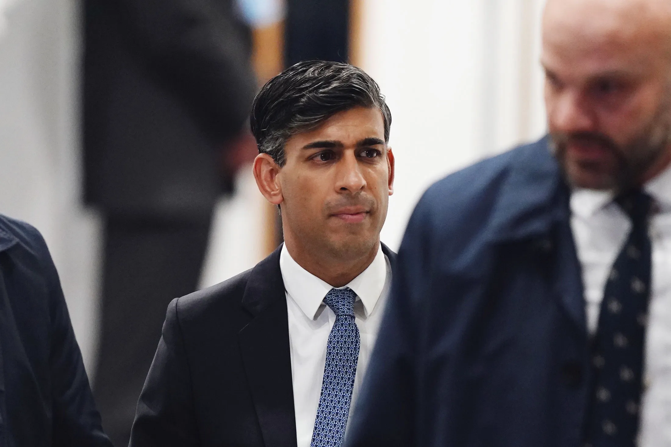 Sunak Battles to Unite UK Tories Behind Rwanda Migrant Plan - Bloomberg