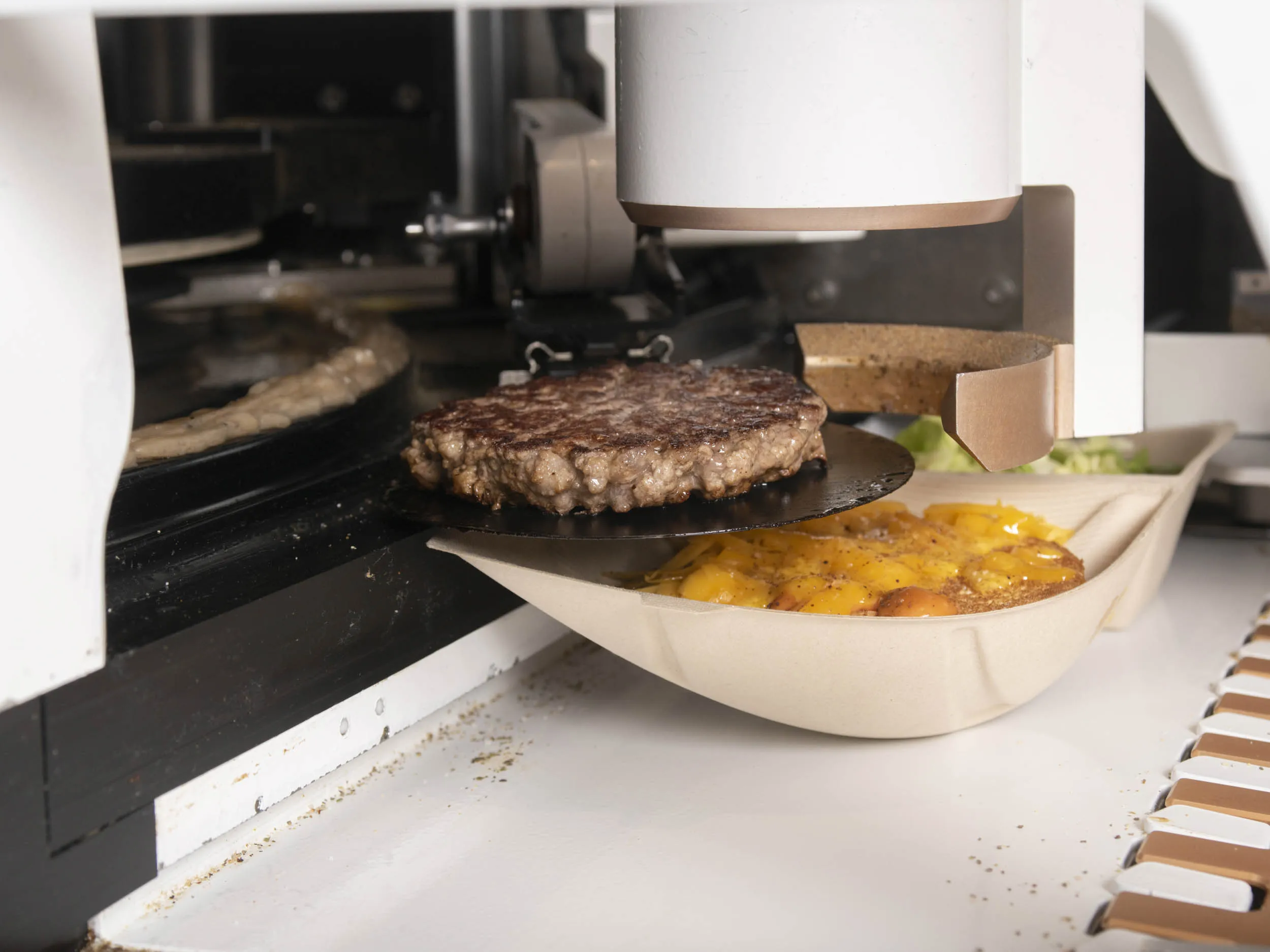 World’s First Robot-Made Burger Is Ready to Hit SF at Creator - Bloomberg