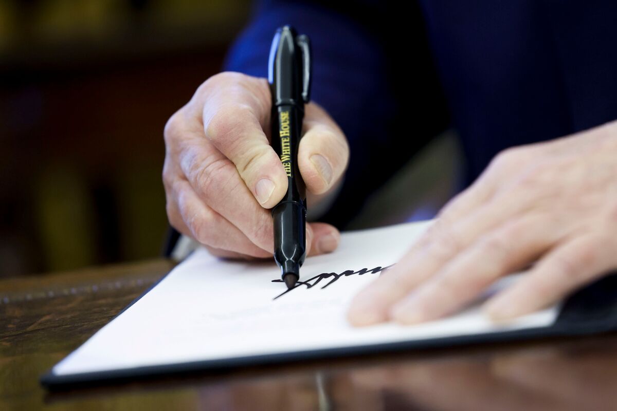 Trump’s Rush to Unleash Executive Power Hits a Judicial Wall - Bloomberg