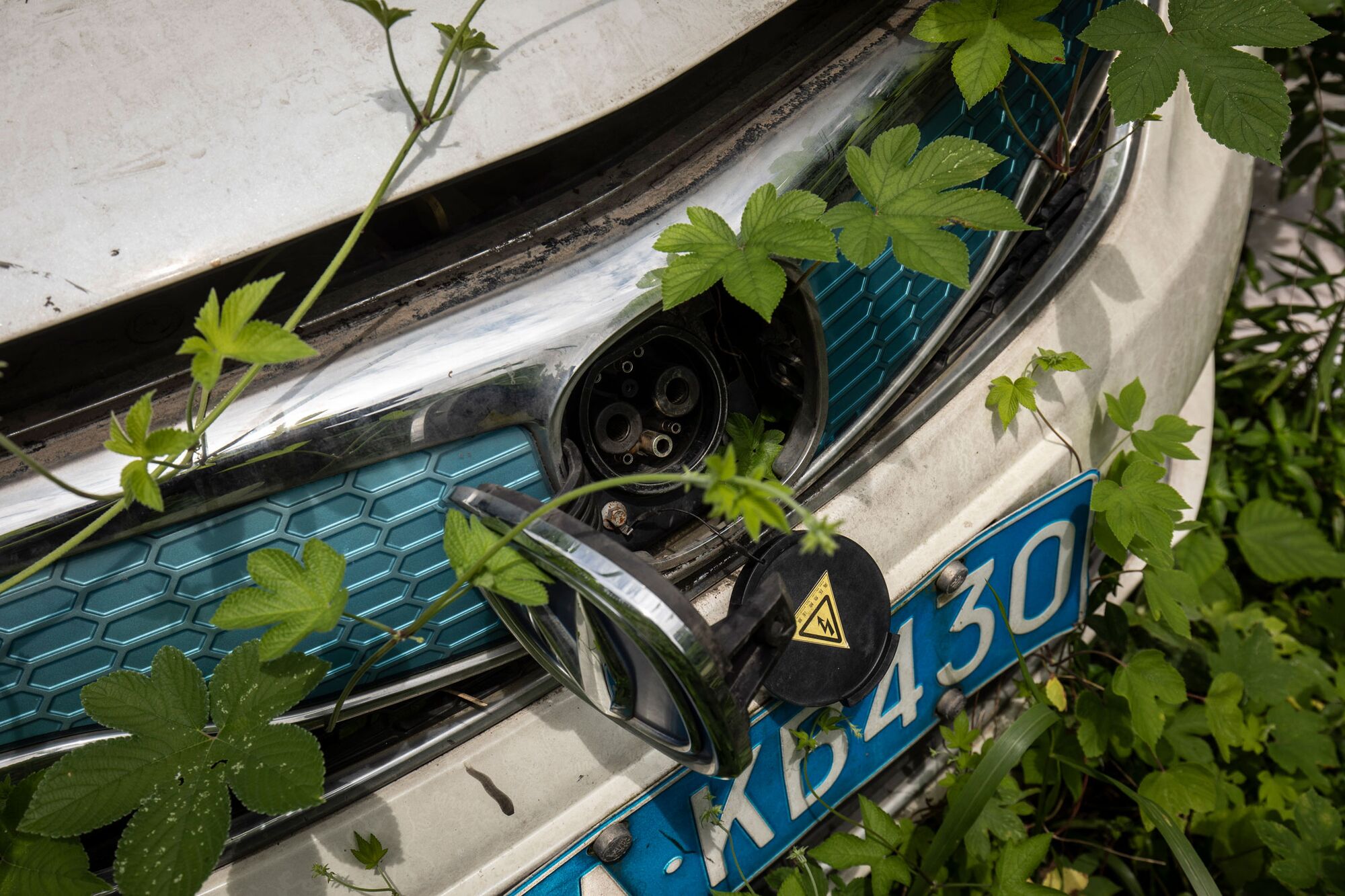 China’s Abandoned Electric Cars Pile Up After EV Boom Fueled by Subsidies