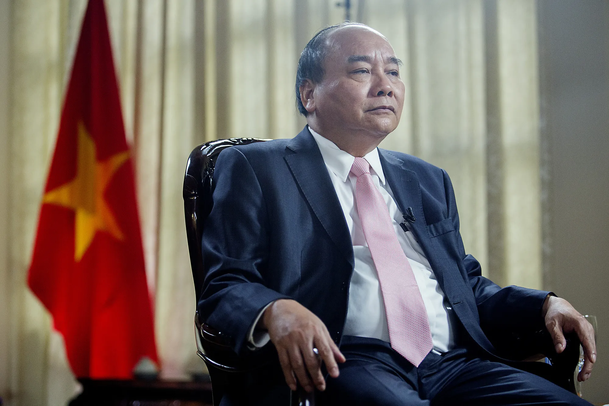 Vietnam President Nguyen Xuan Phuc Loses Communist Party Titles in Rare Shakeup - Bloomberg