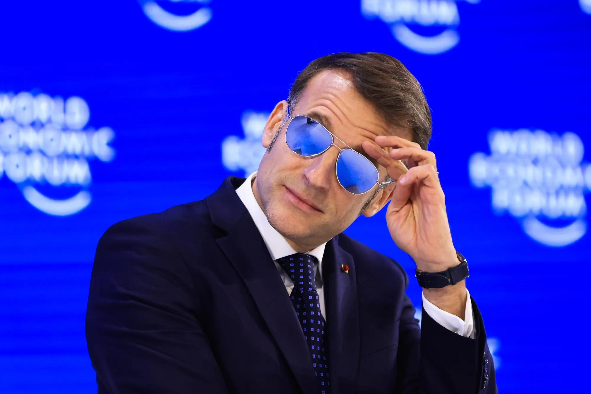 Macron’s Davos Shades Crash Italian Maker’s Website, Boost Shares ...