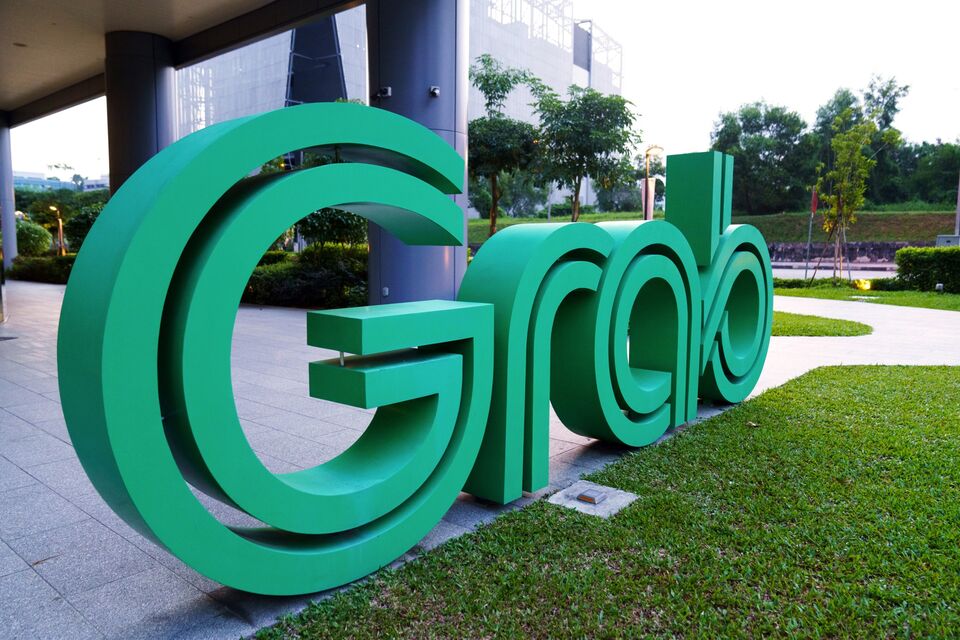 Singapore’s Grab Hits Adjusted Profit, Decade After Founding - Bloomberg