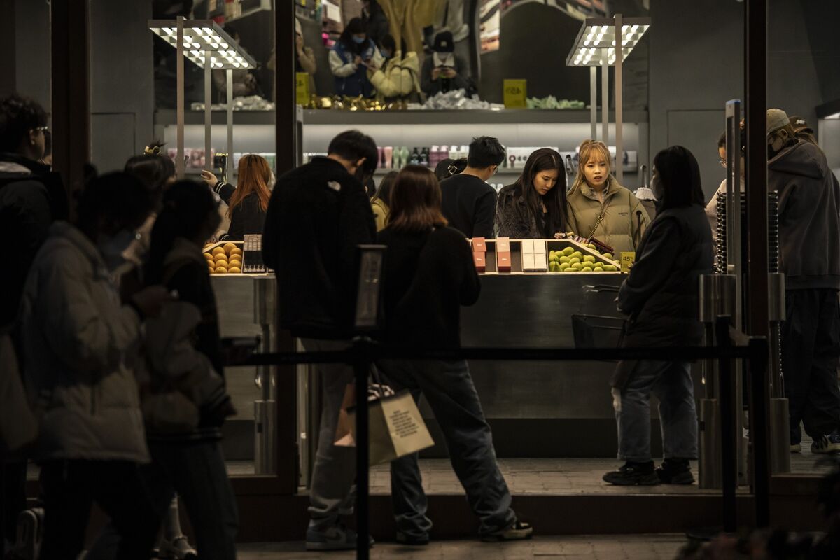 China Services Sector Expands in December, Private Survey Shows - Bloomberg