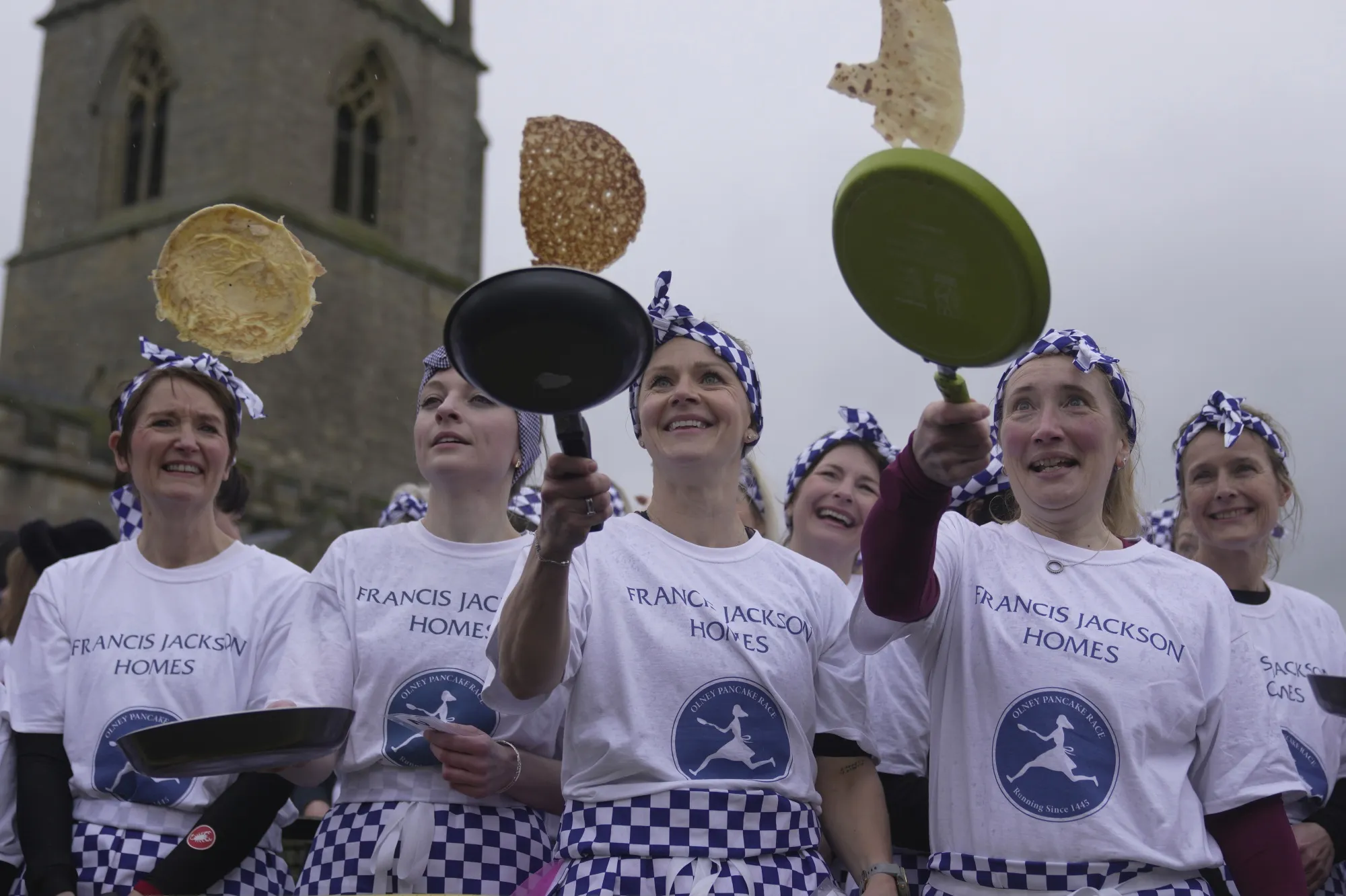 In this centuries-old English pancake race, 'you just have to go flat ...