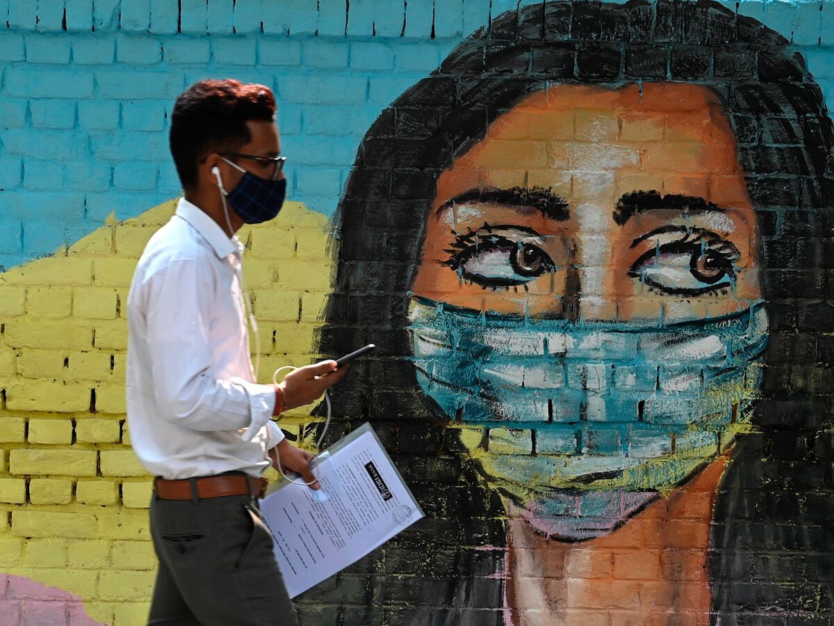 Should I Keep Wearing a Mask After Covid? - Bloomberg