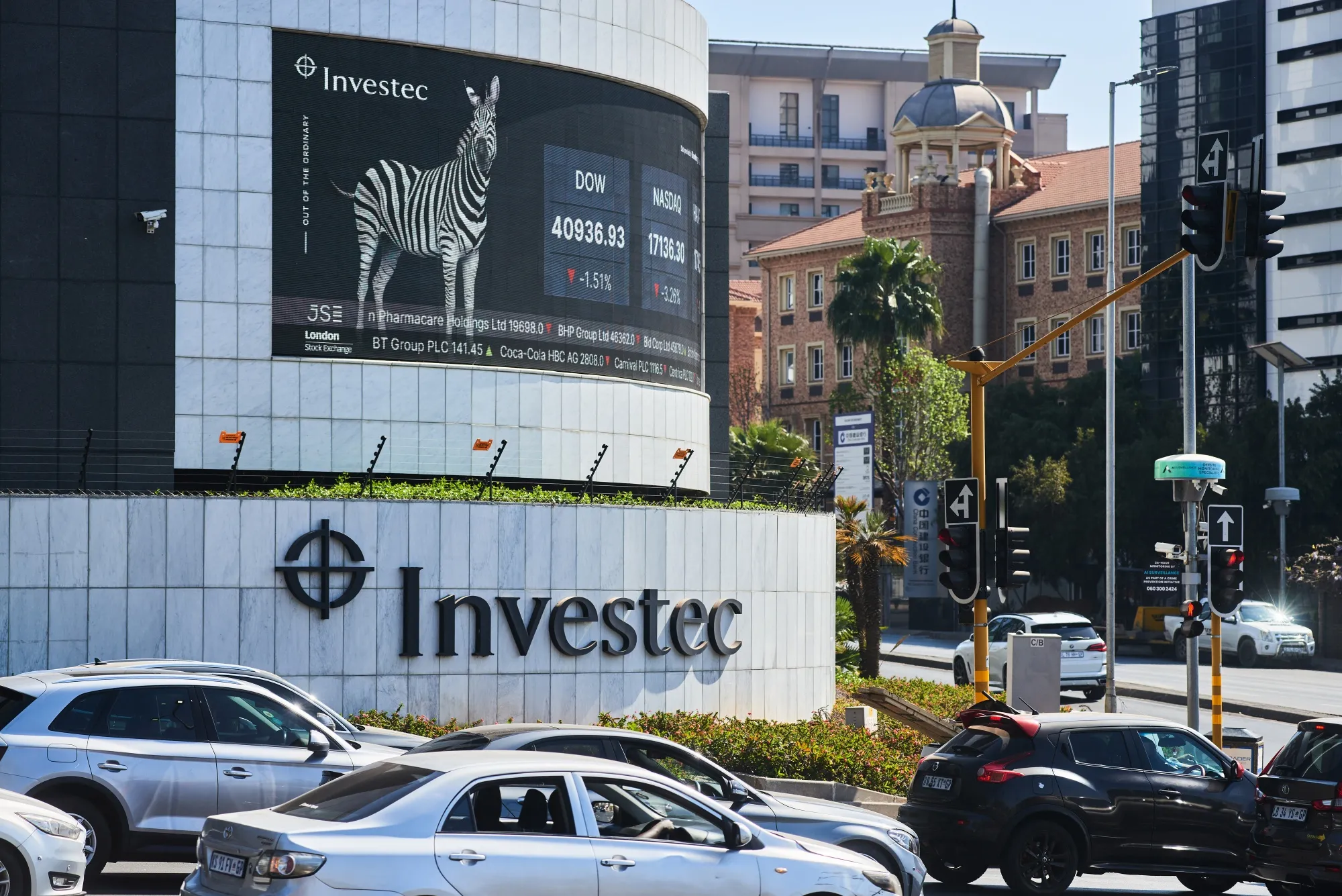 Investec Posts Record Interim Dividend as Profits Climb - Bloomberg