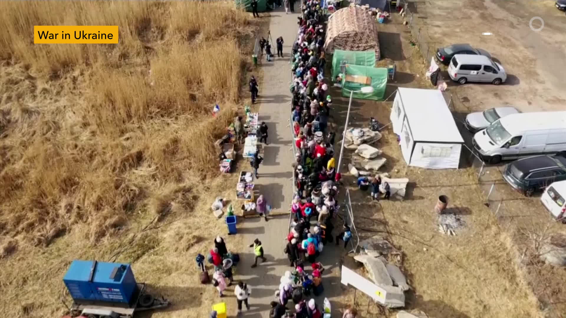 Watch Ukrainian Refugees Arrive at Polish Crossing - Bloomberg