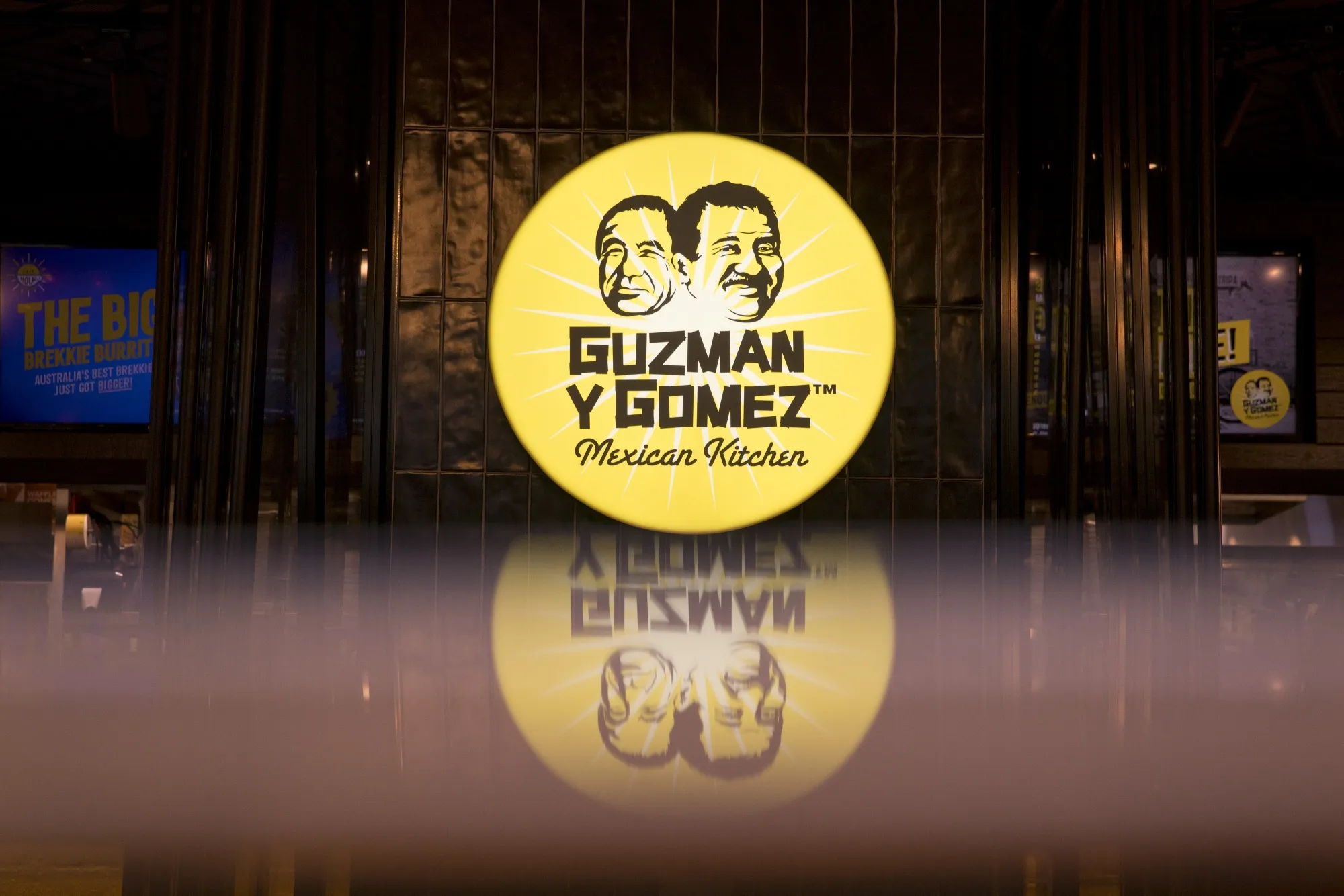Guzman Logo