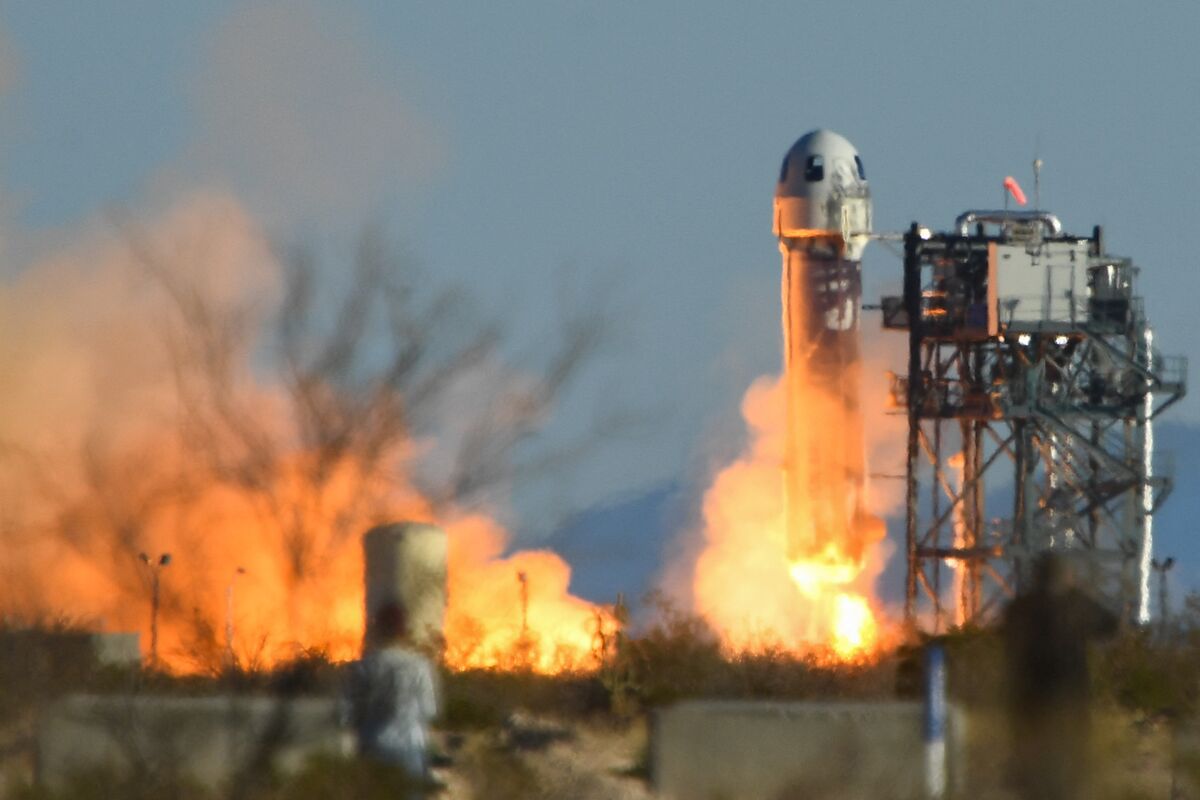 Bezos’ Rocket Firm Blue Origin to Halt Space Tourism Flights - Bloomberg
