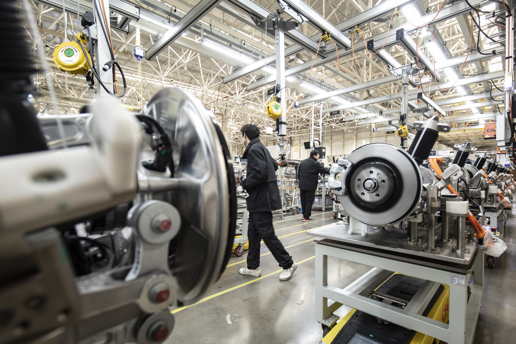 China Defends Manufacturing Push, Says World Needs More EVs - Bloomberg