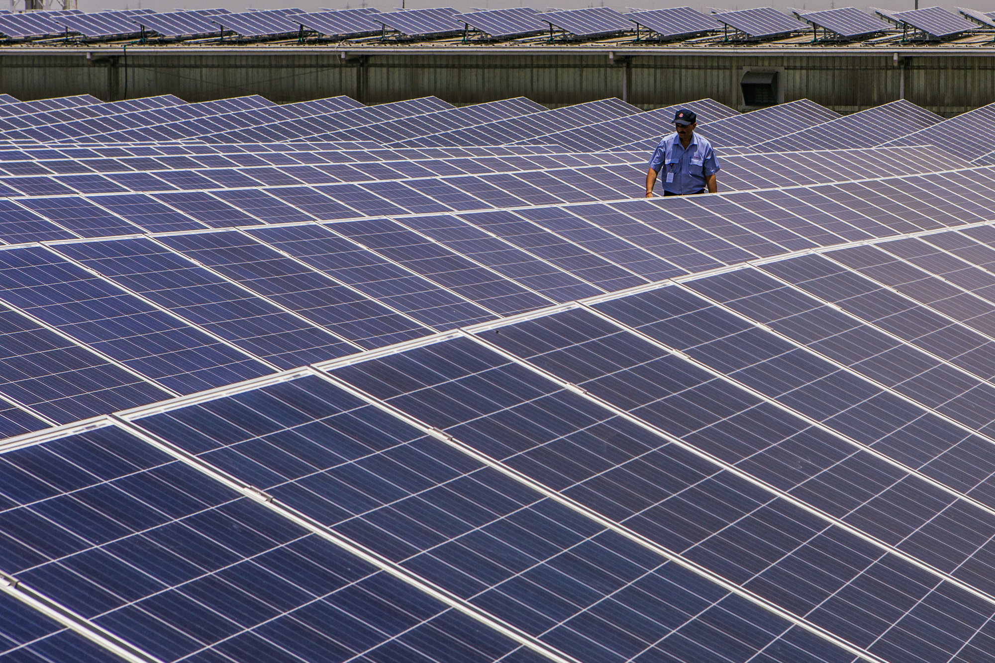 Solar Tariffs Remain at Record Low in India's Largest Auction - Bloomberg