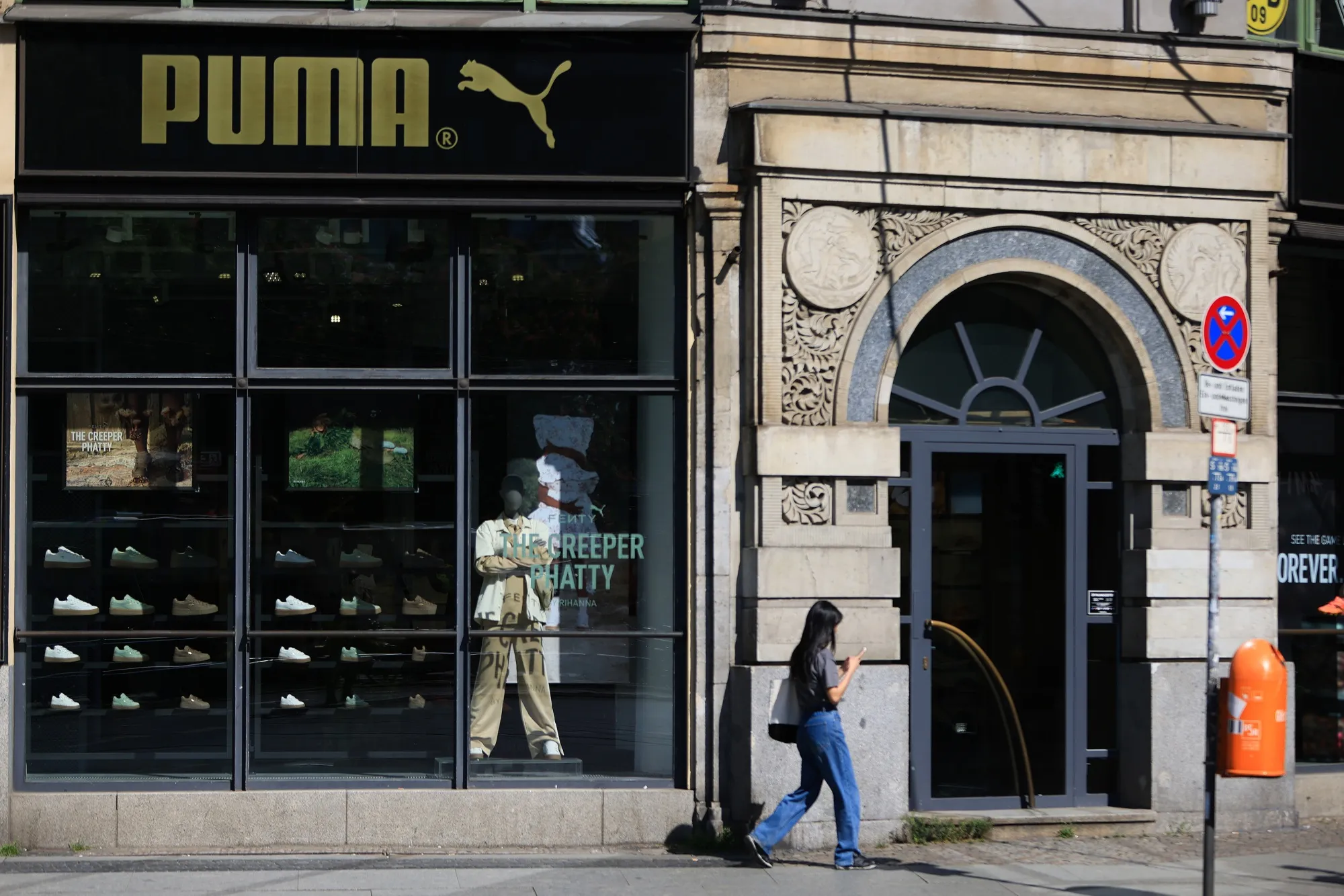 Puma Cites Tariffs, Geopolitical Tensions in 2025 Forecast - Bloomberg