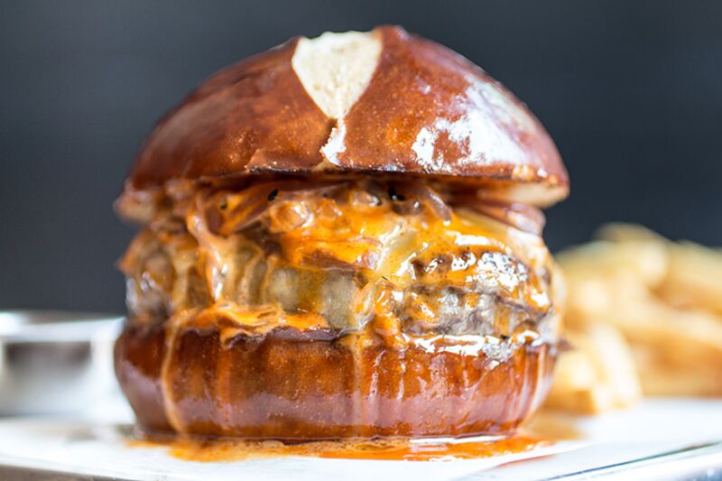 The Emmy Burger Pretzel Bun With A Cheese And Buffalo Sauce Mix Rburgers