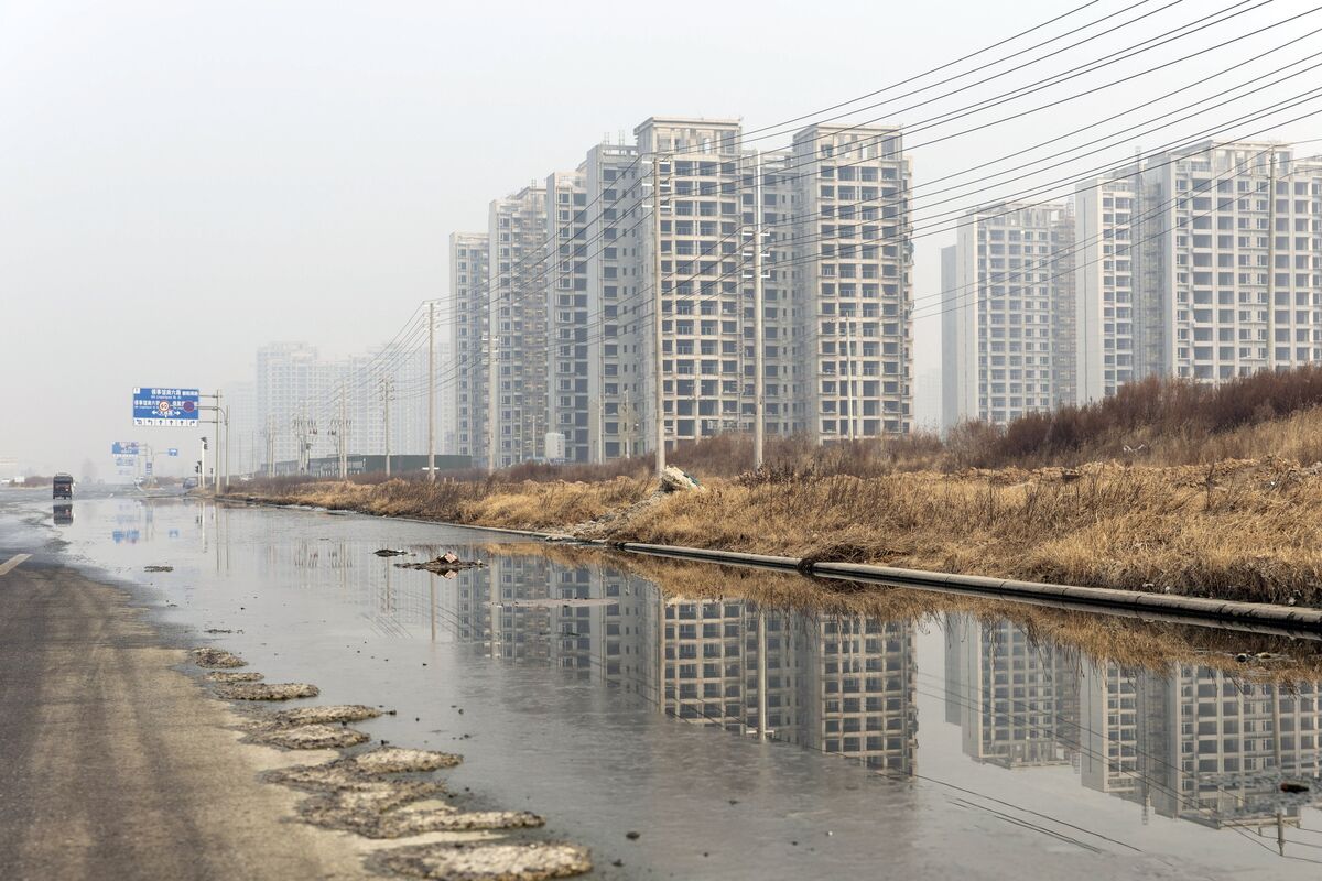 China Property Share Slump as Home Sales Fall During Holiday - Bloomberg