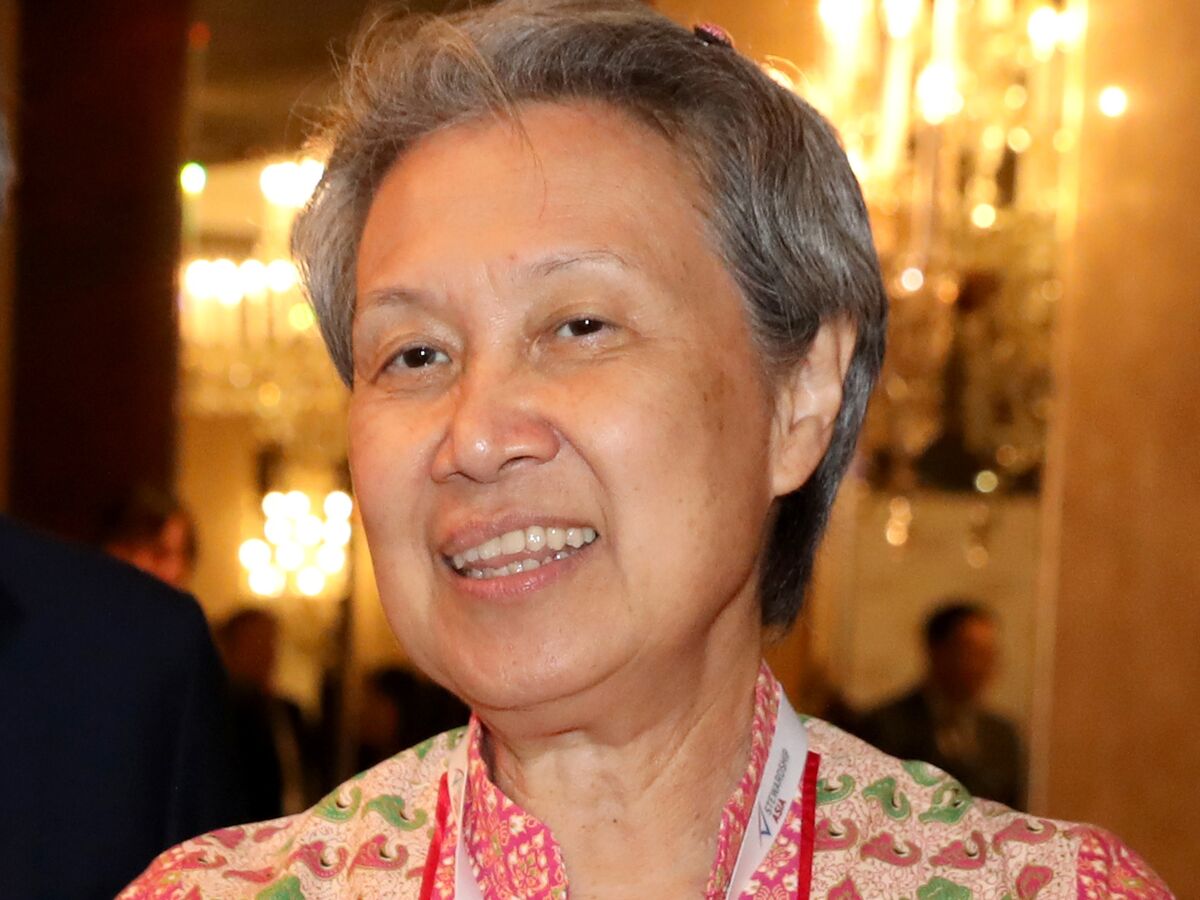 Temasek Chief Defends Investments in Polluters in Final Speech - Bloomberg