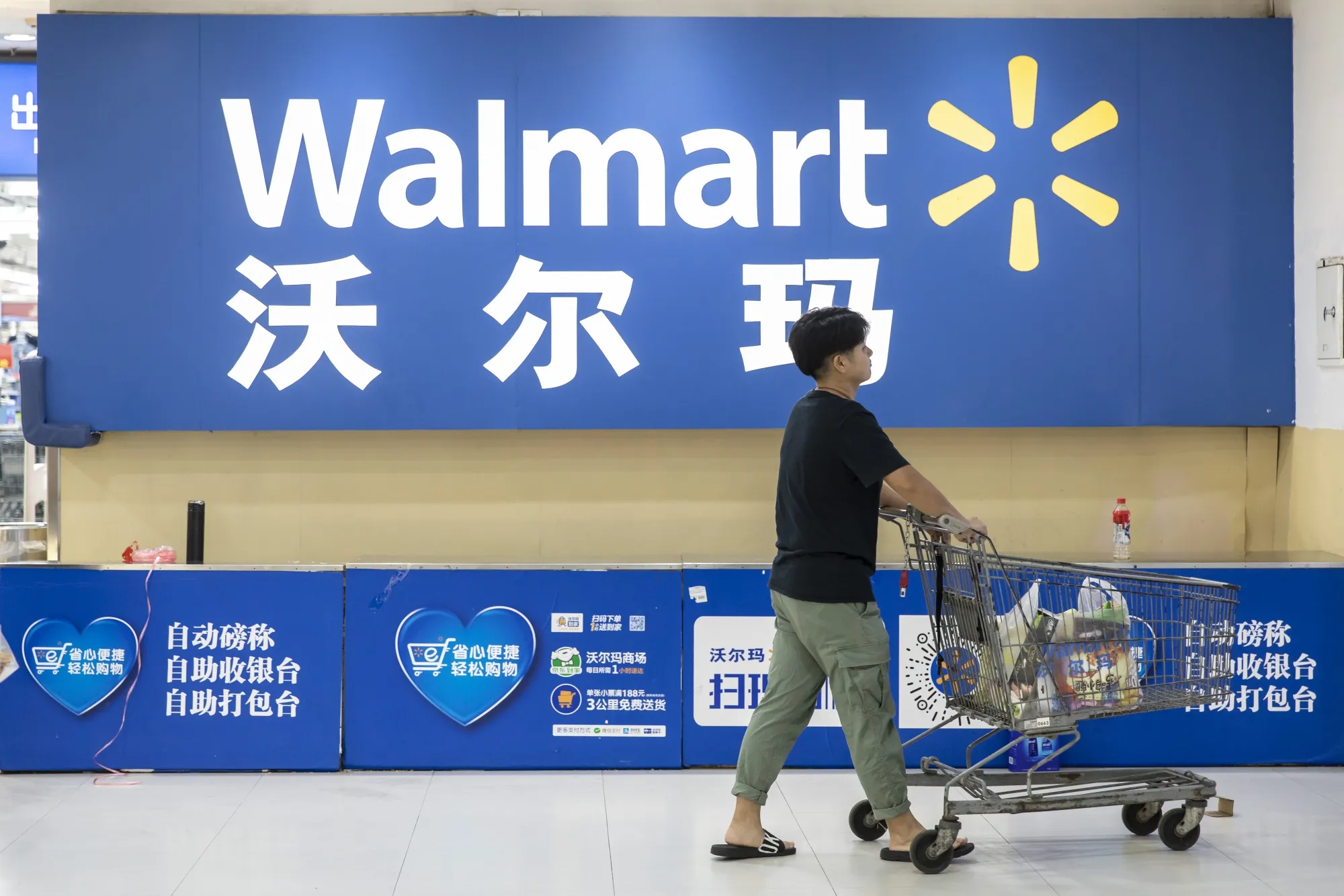 Walmart’s China Plan Adds Optimism to Asia Grocers - Bloomberg
