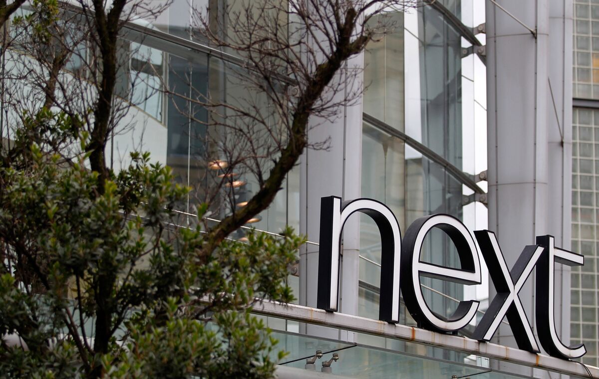 Next Raises Profit Forecast as Party Clothes Buoy Sales - Bloomberg