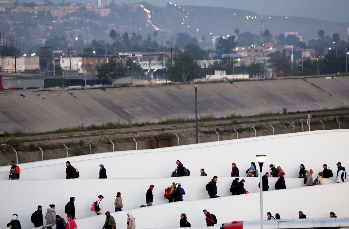 One Answer to the Migration Crisis? Jobs. - Bloomberg