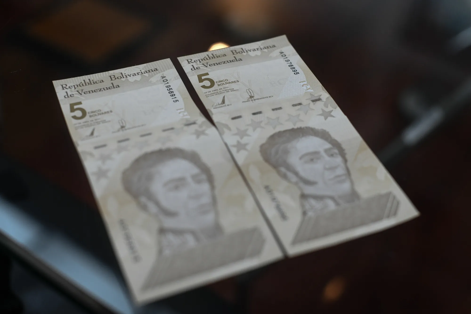Venezuela Burns Scarce Cash to Prop Up Its Revamped Currency - Bloomberg
