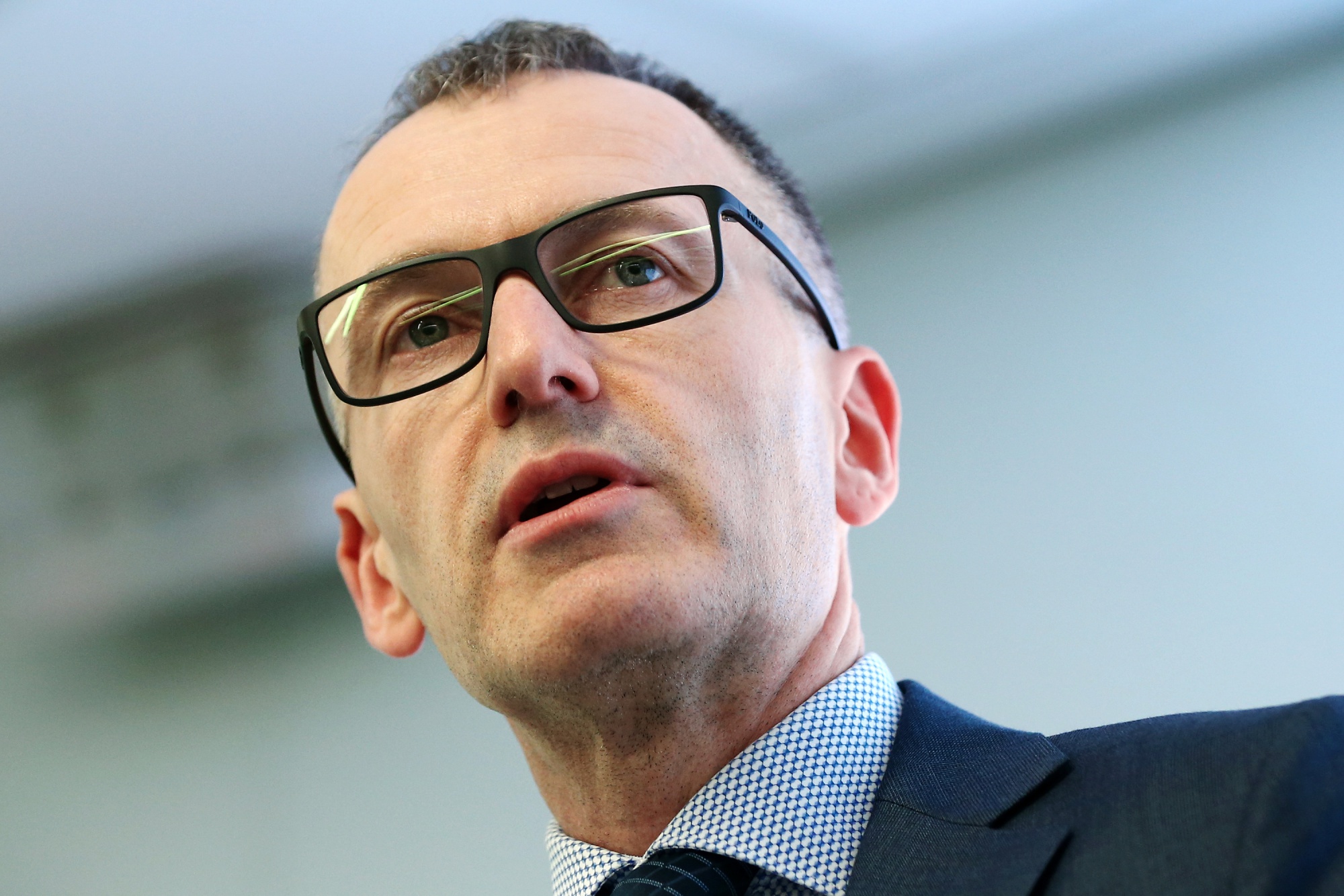 RBA’s Kent Says Rate Cuts Containing Currency, QE a Long Way Off ...