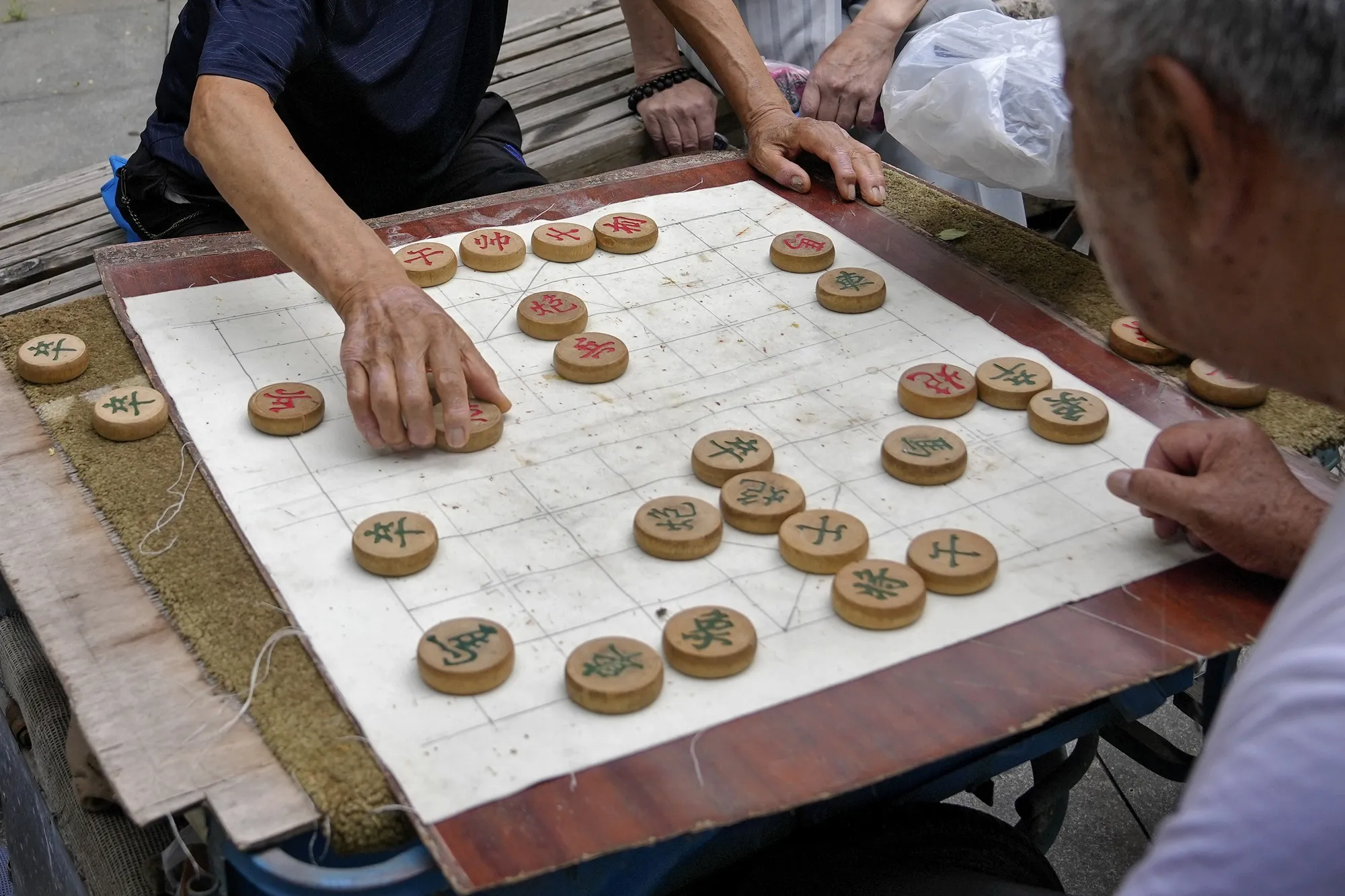 Chinese chess player sues to reclaim the title he lost for defecating ...