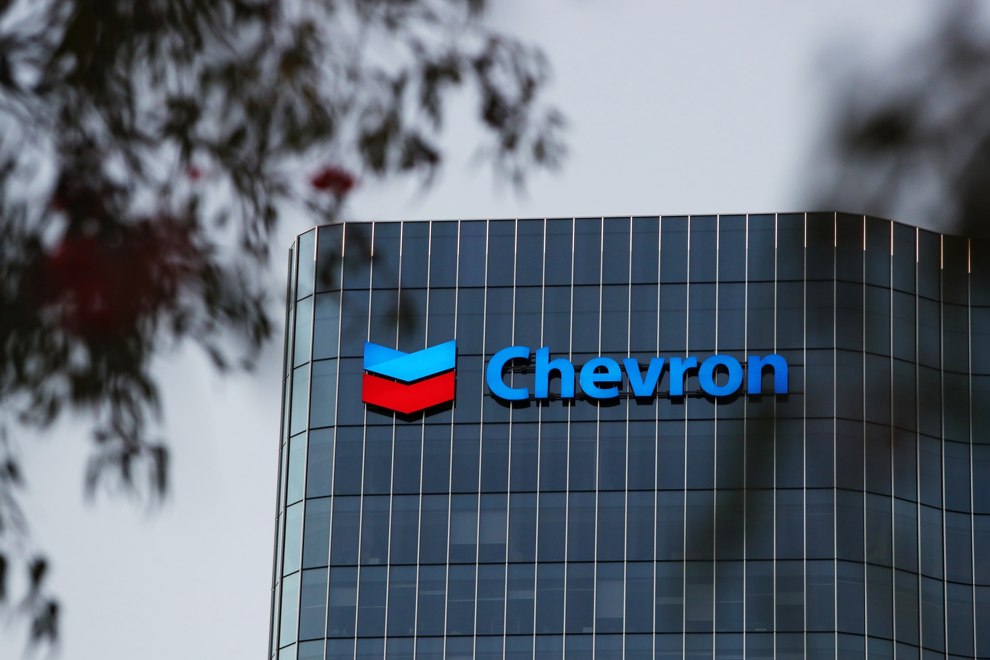 Australia News Today: Chevron Strike, UBS Cuts, New iPhone - Bloomberg