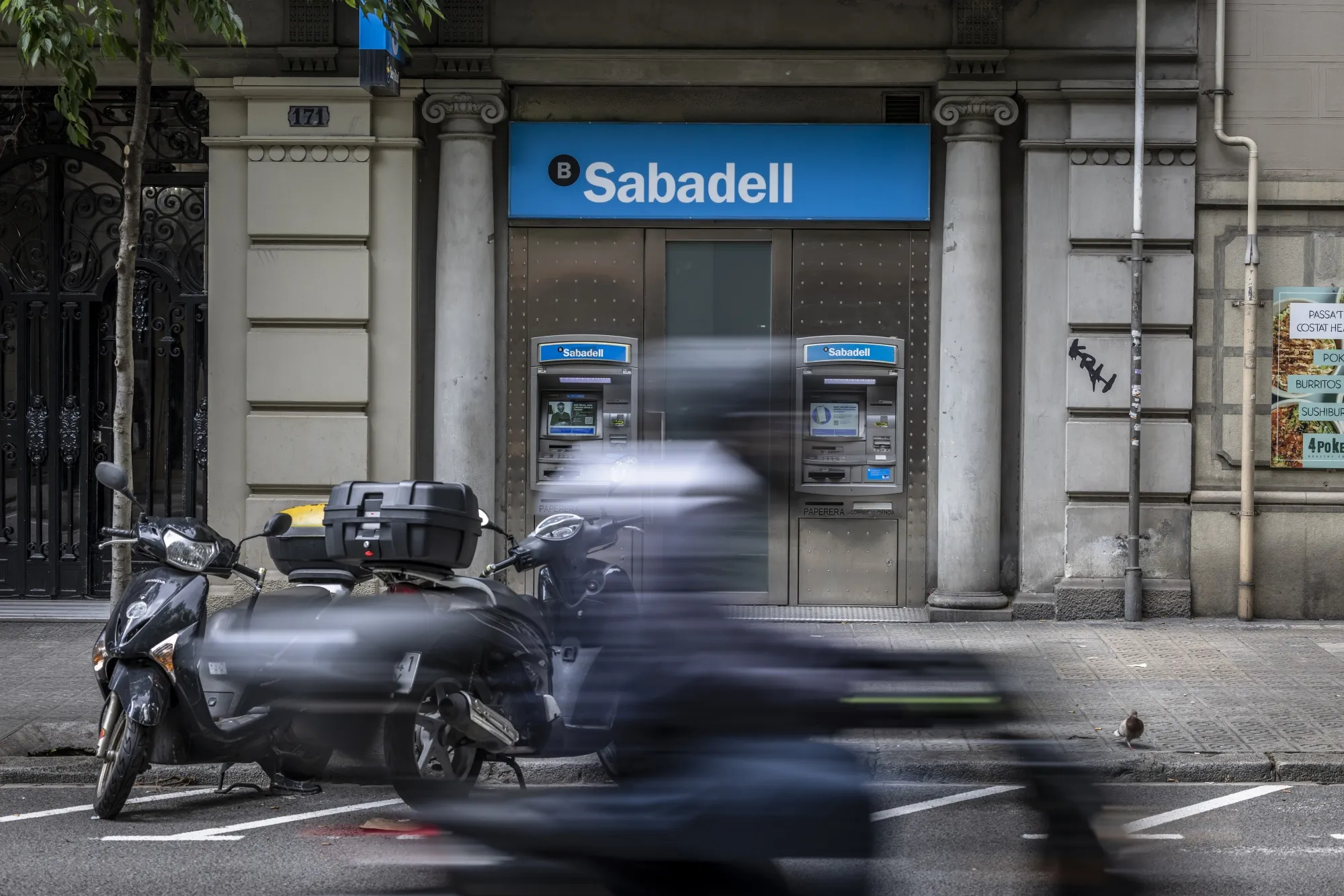 BBVA’s Sabadell Takeover Bid Gets Approval from UK Regulator - Bloomberg