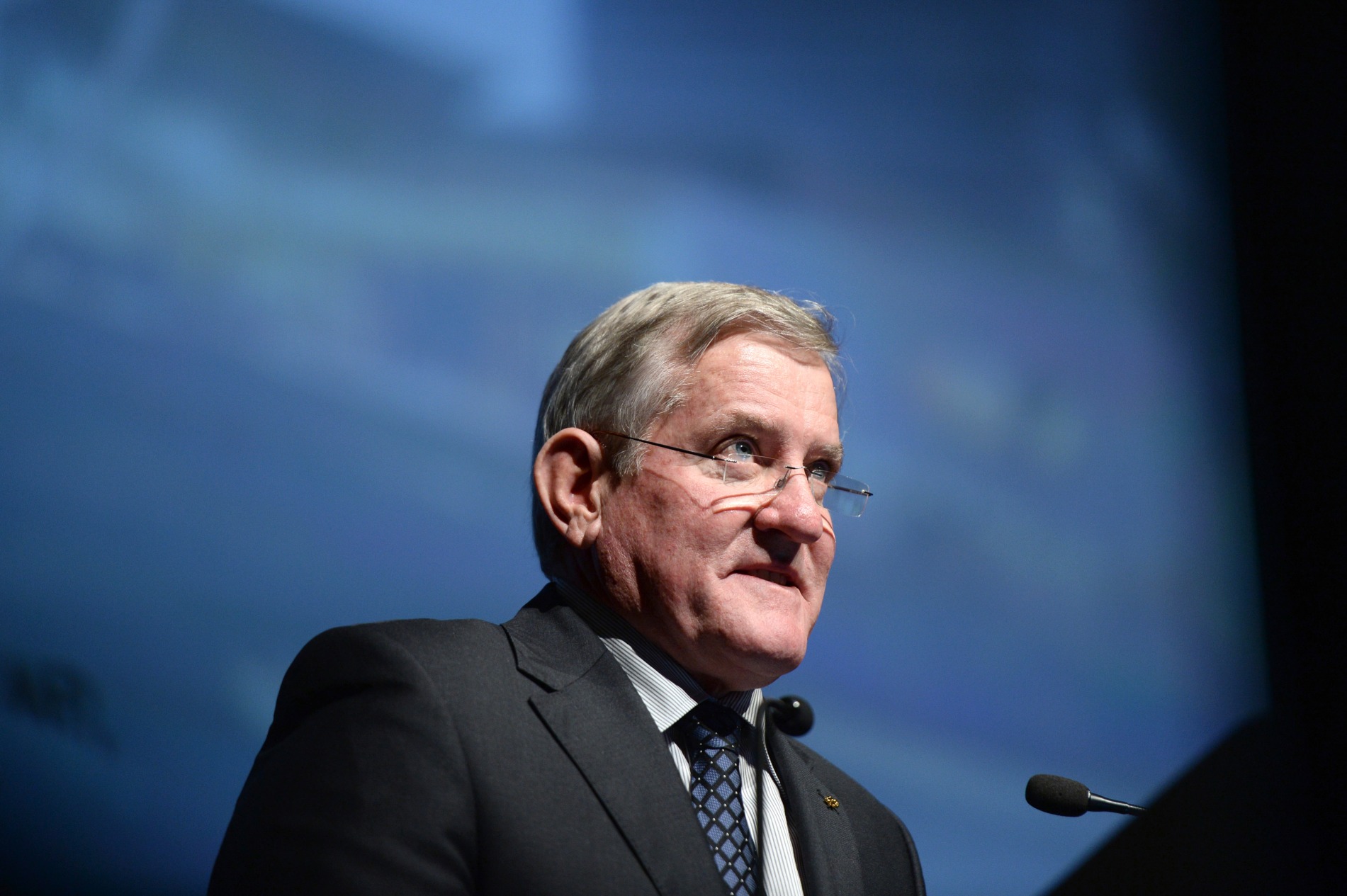 Australia Cash Rate Will Rise by ‘a Lot More,’ Ex-RBA Chief Says - Bloomberg