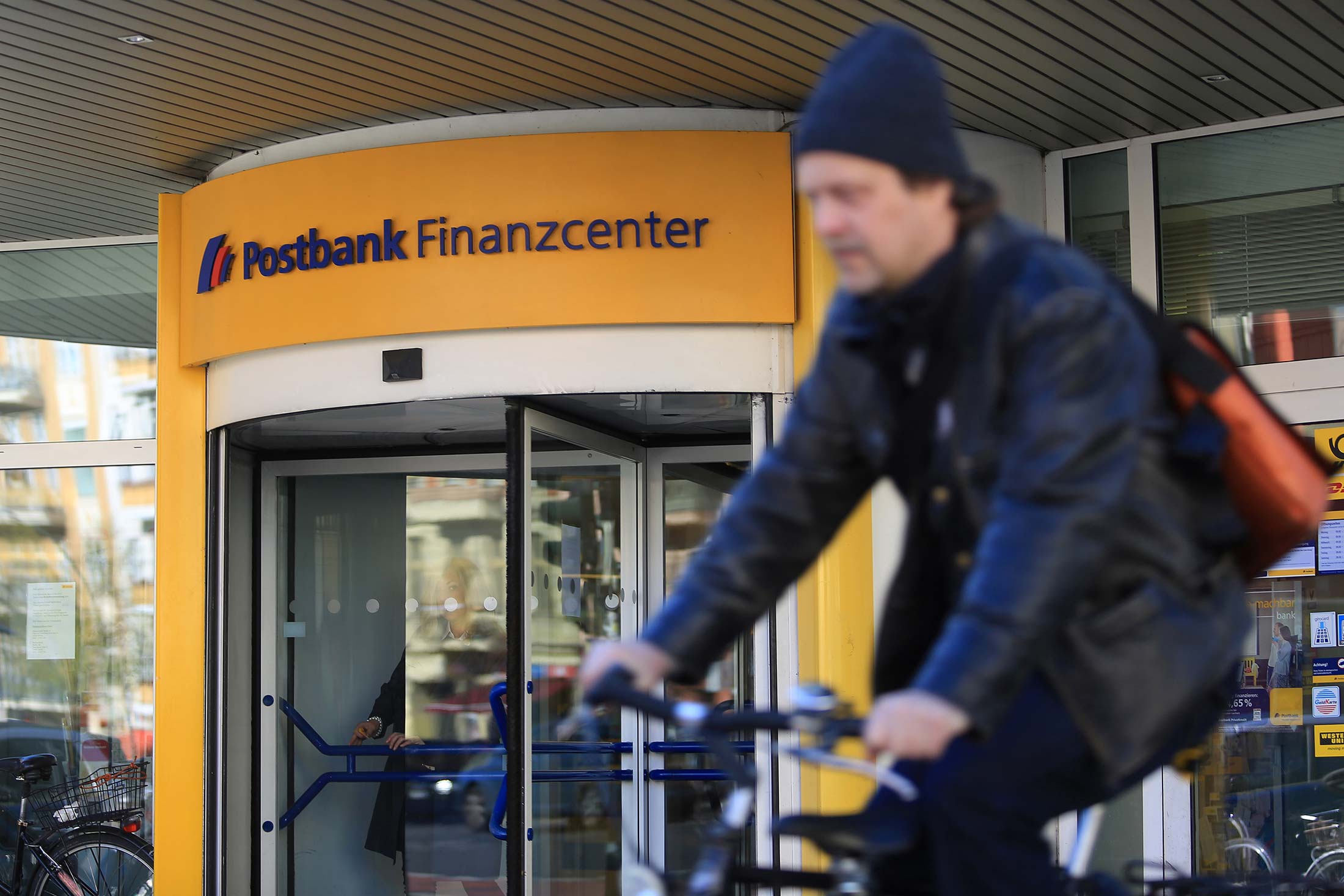 Deutsche Bank May Write Down Postbank Again Closer to Sale - Bloomberg