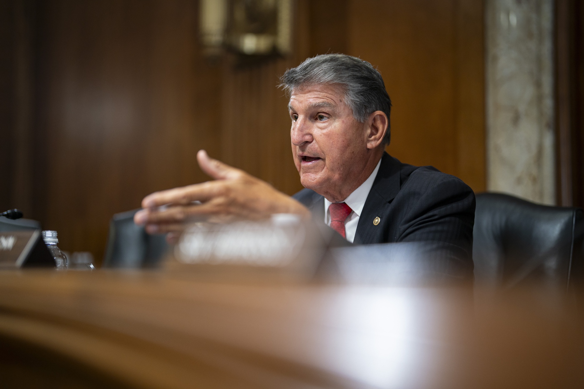 Manchin Slams Biden’s EV Tax Credit Rules as Soft on China - Bloomberg