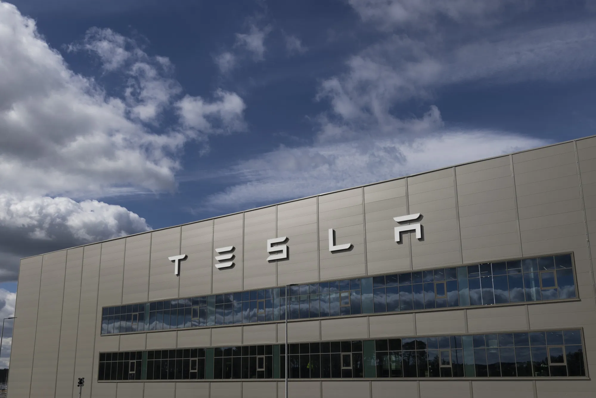 Tesla to Make €25,000 EV at Berlin Factory, Reuters Reports - Bloomberg