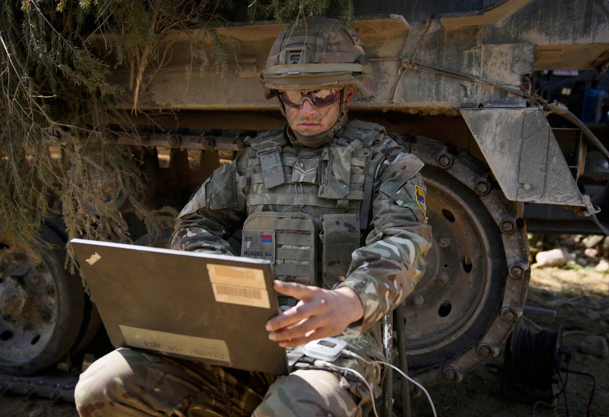 White House Urges Agencies to Adopt AI for Military, Spy Use - Bloomberg