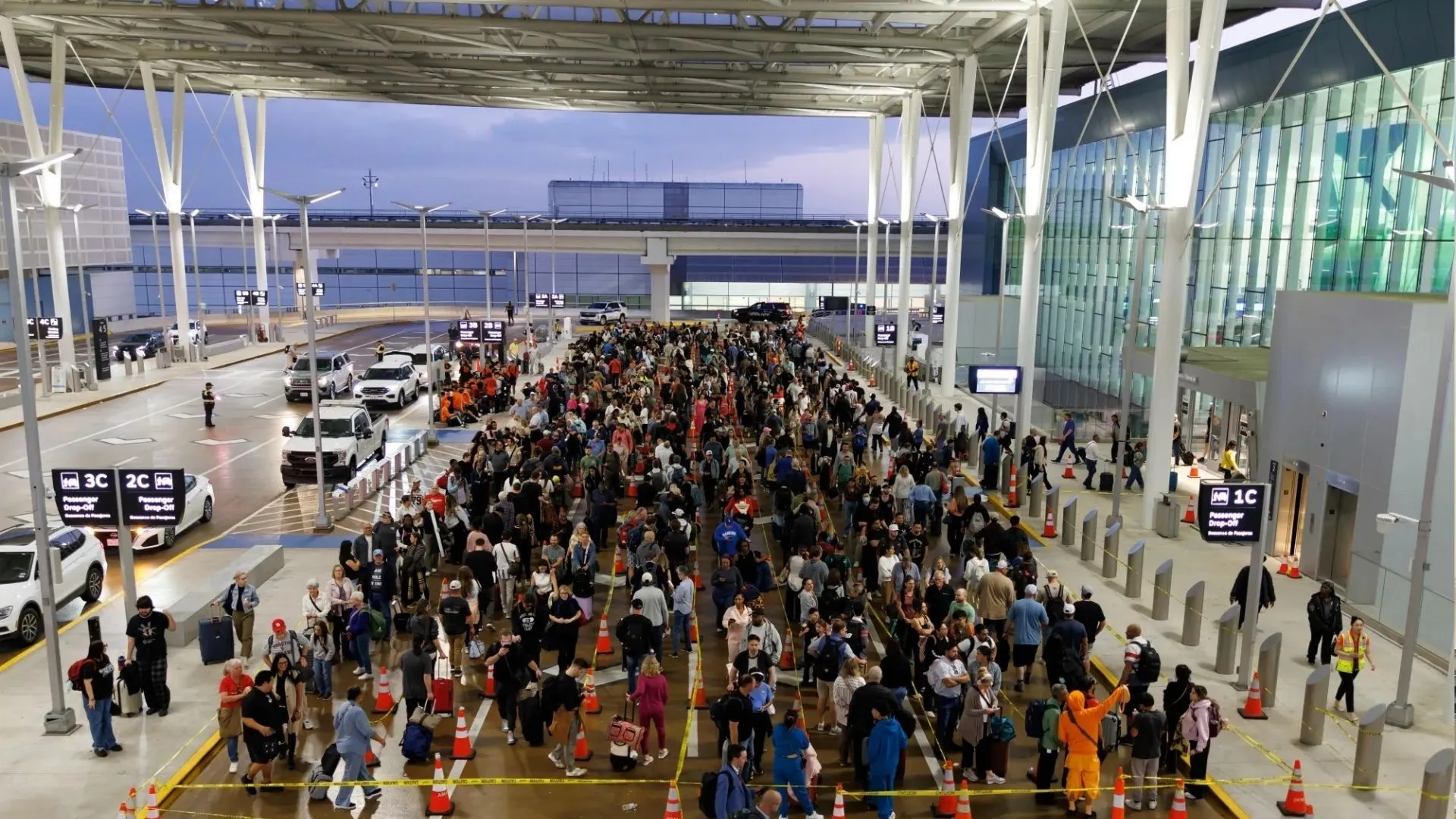 Watch Airport Lines Stretch for Hours, Forcing Travelers to Pivot to ...