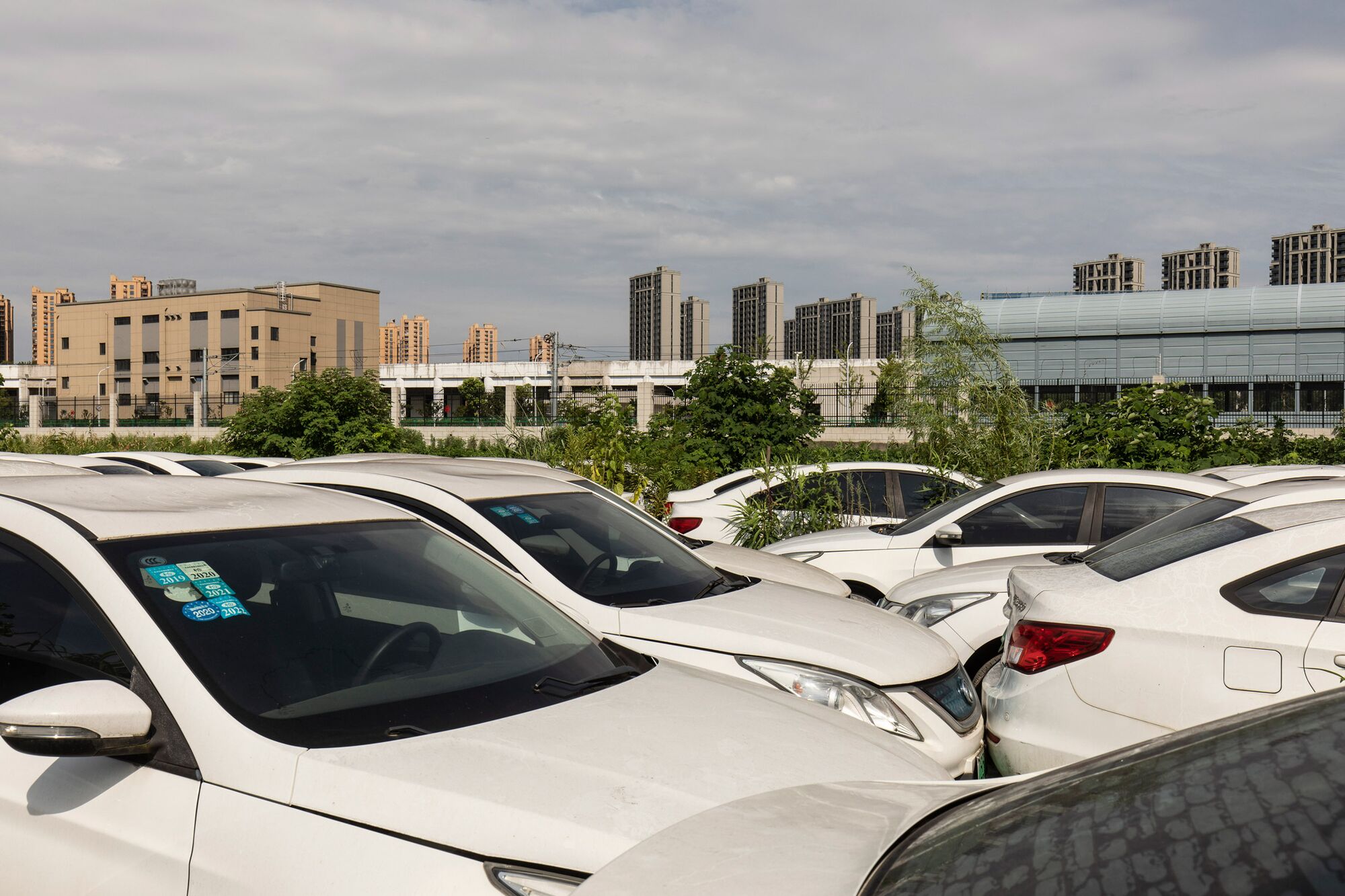 China’s Abandoned Electric Cars Pile Up After EV Boom Fueled by Subsidies