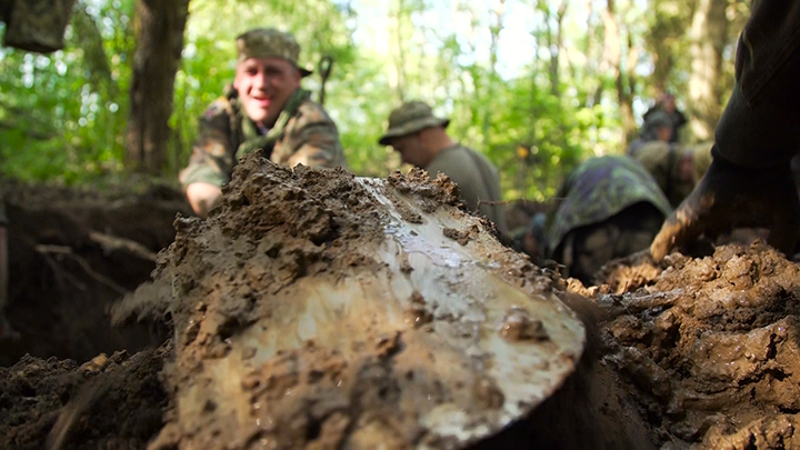 Meet the Grave Diggers Reburying the Nazi Dead