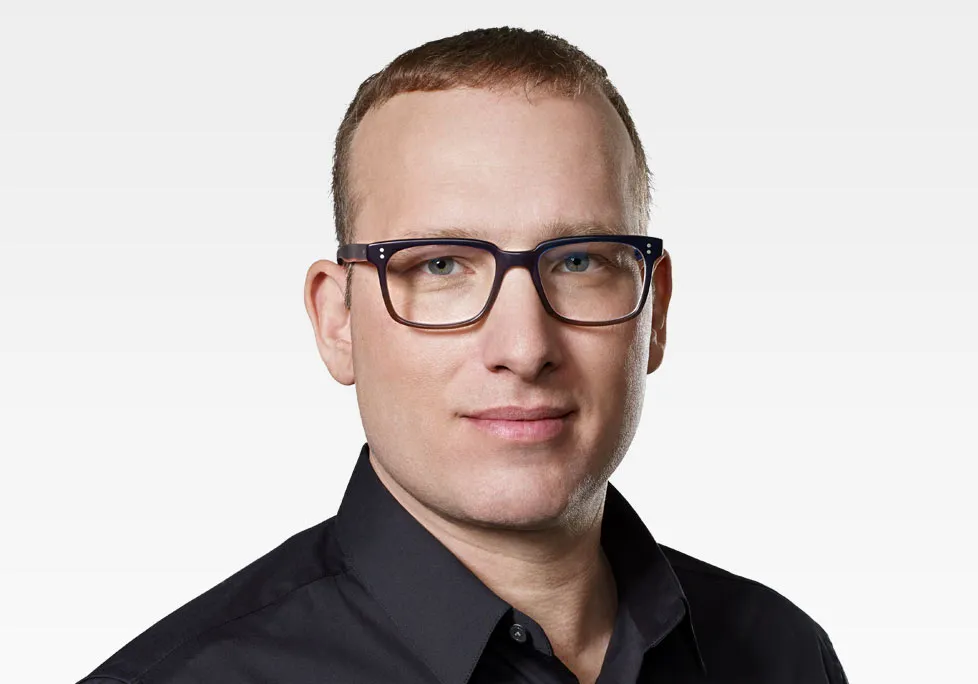 Apple (AAPL) M&A Chief Now Reporting to Tim Cook - Bloomberg