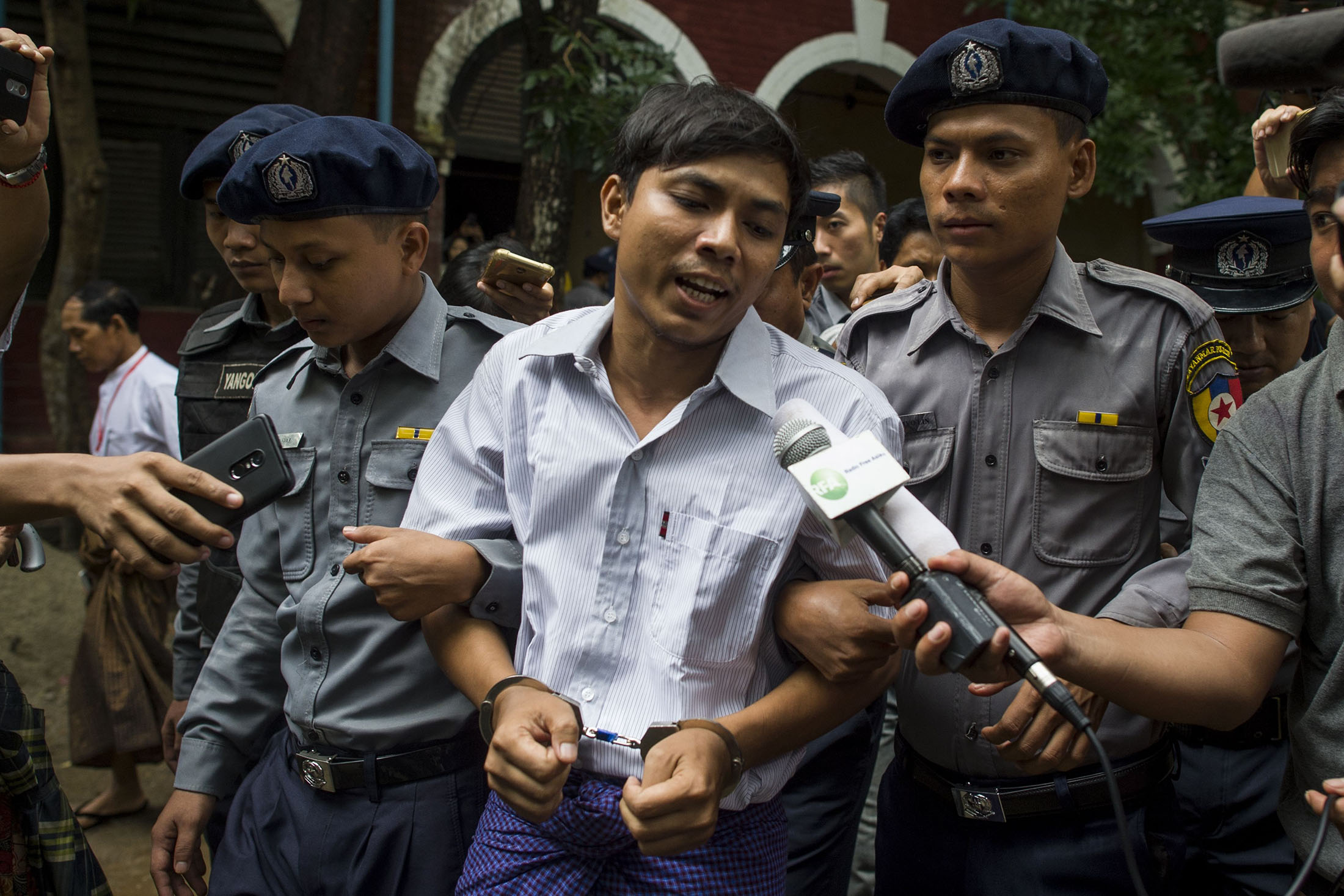 Myanmar Sentences Reuters Journalists to Seven Years in Jail - Bloomberg