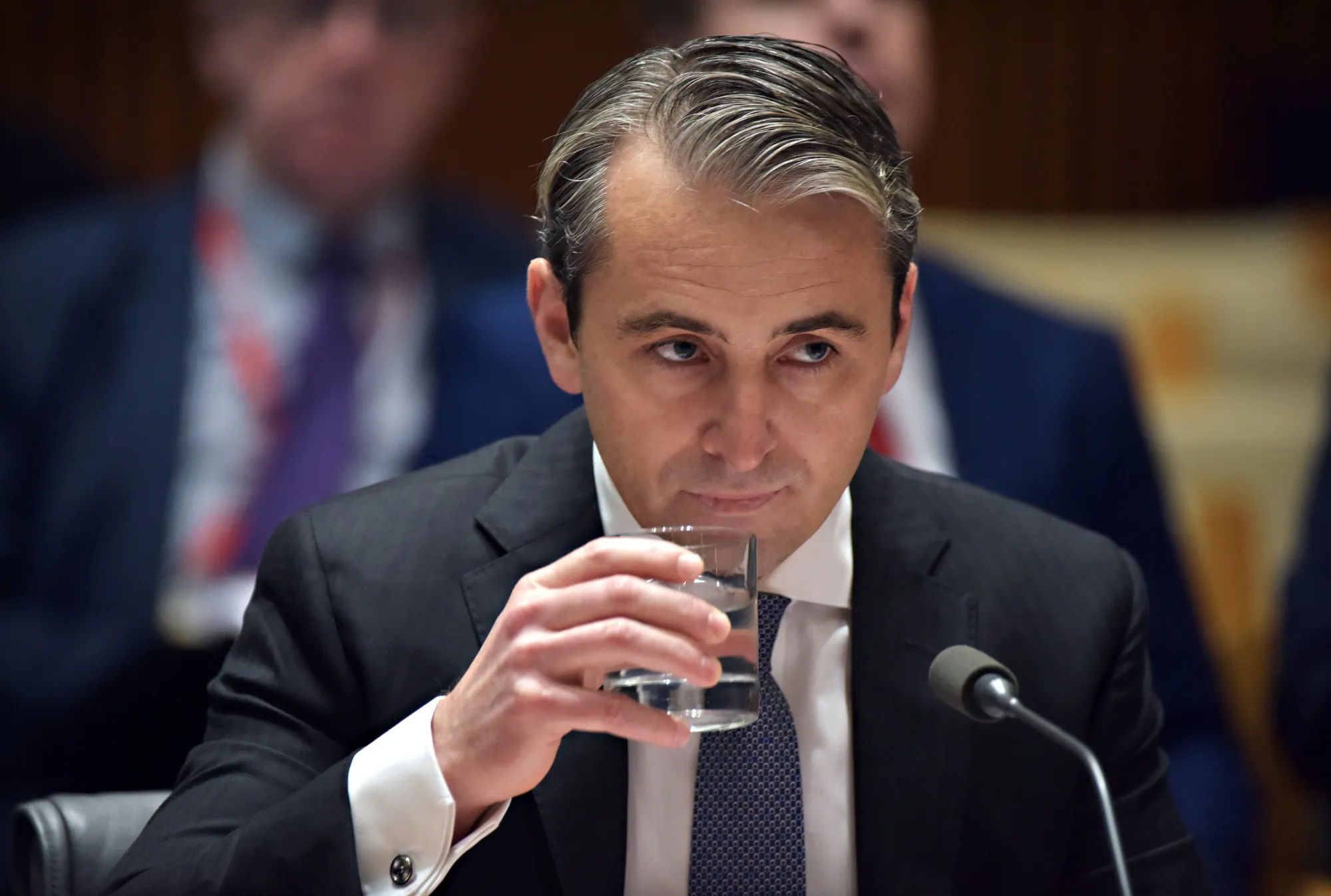 Comyn Pins Blame on Predecessor for Junk Credit Card Insurance - Bloomberg